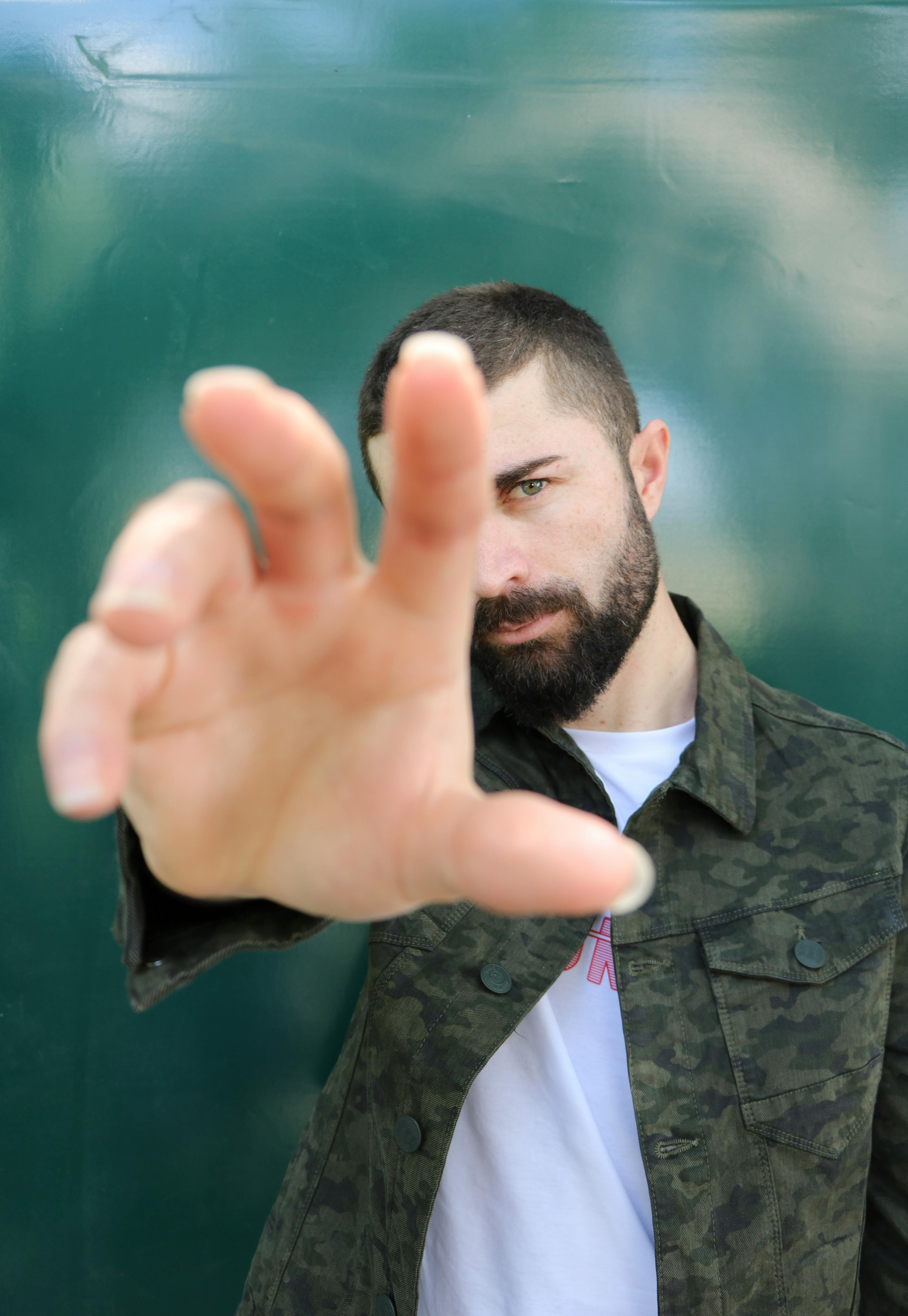 A Man Reaching His Hand Out · Free Stock Photo