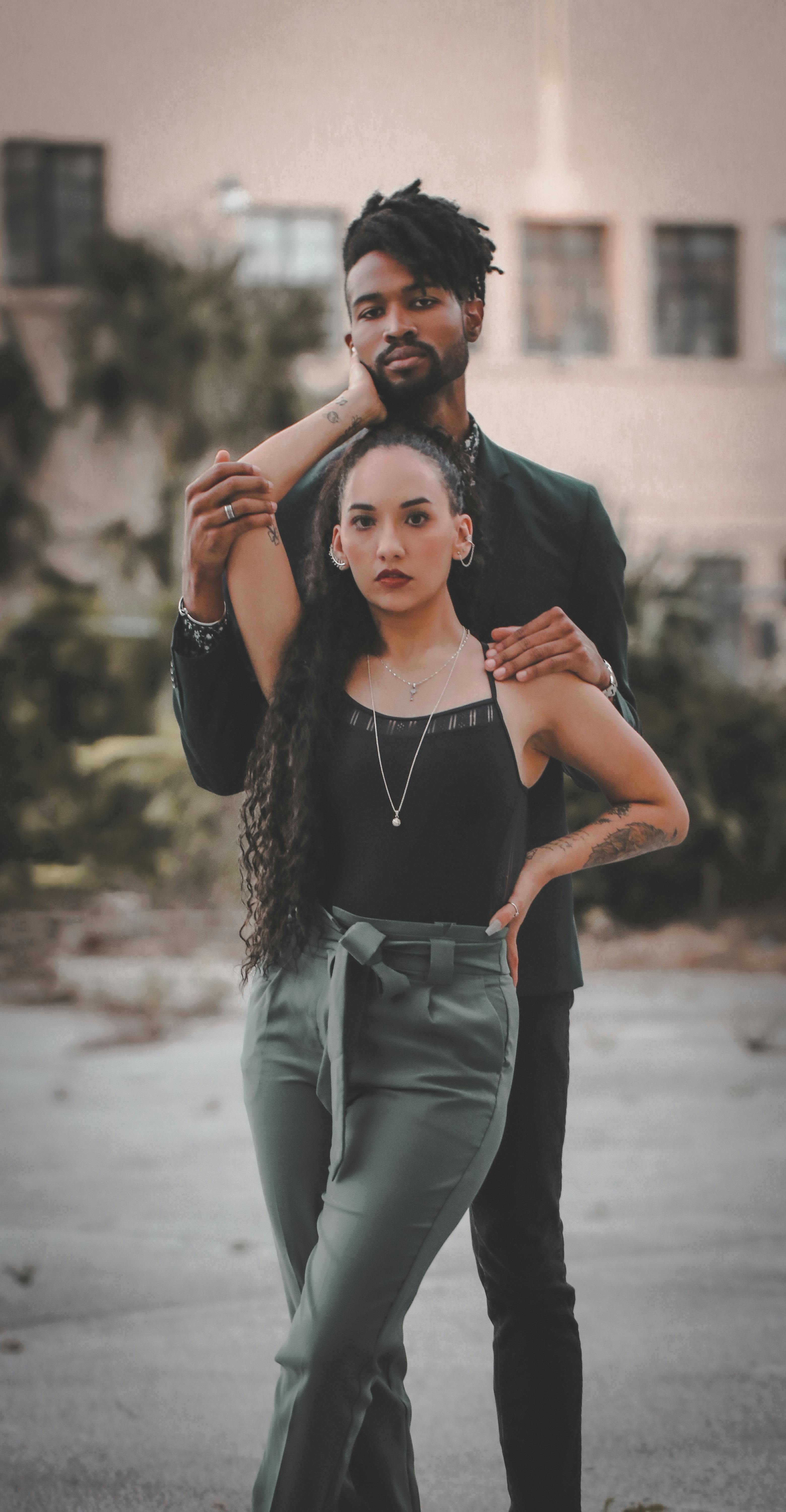 Man Standing Behind a Woman · Free Stock Photo