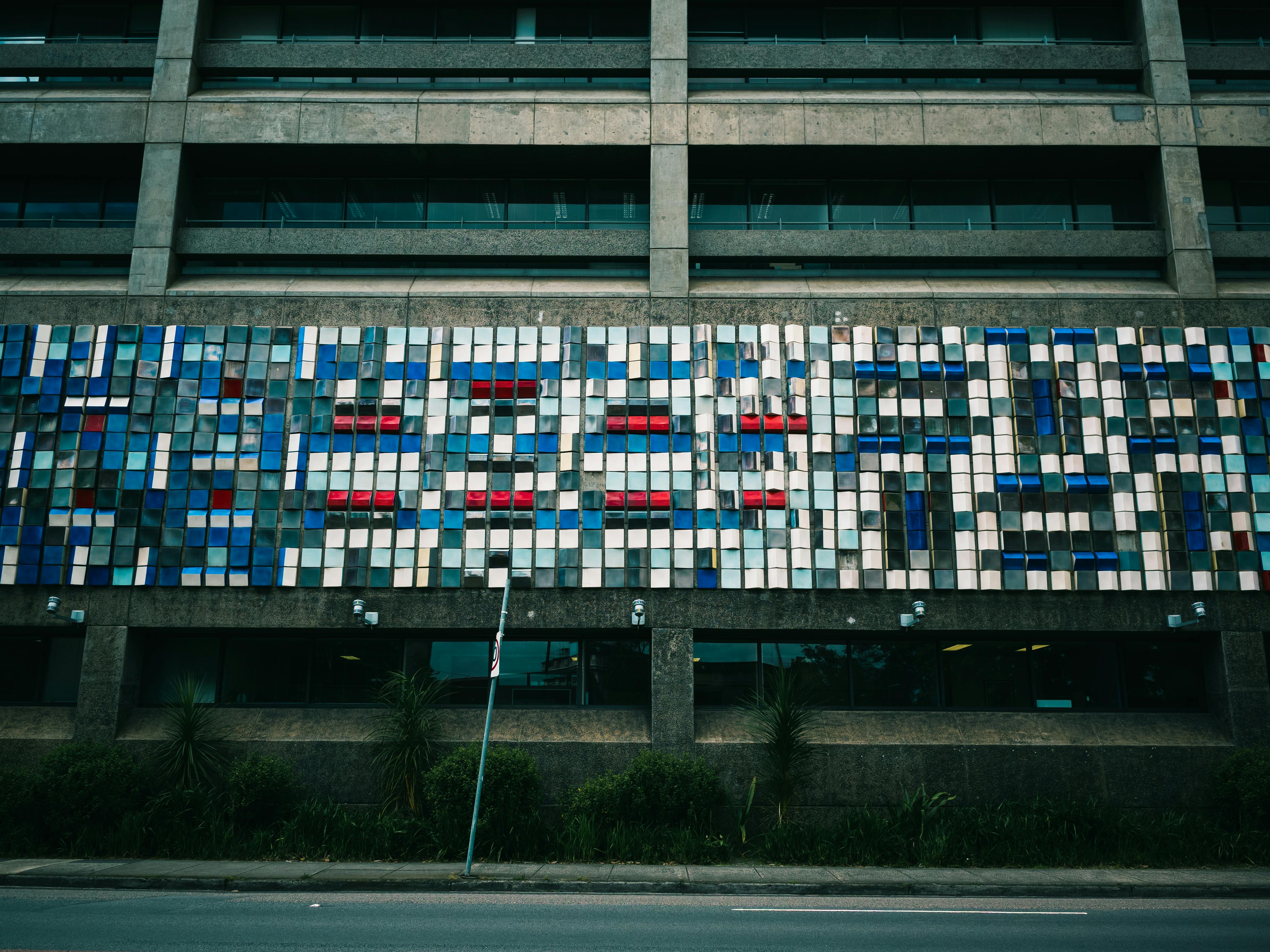 Building Facade with Mosaic Decor · Free Stock Photo