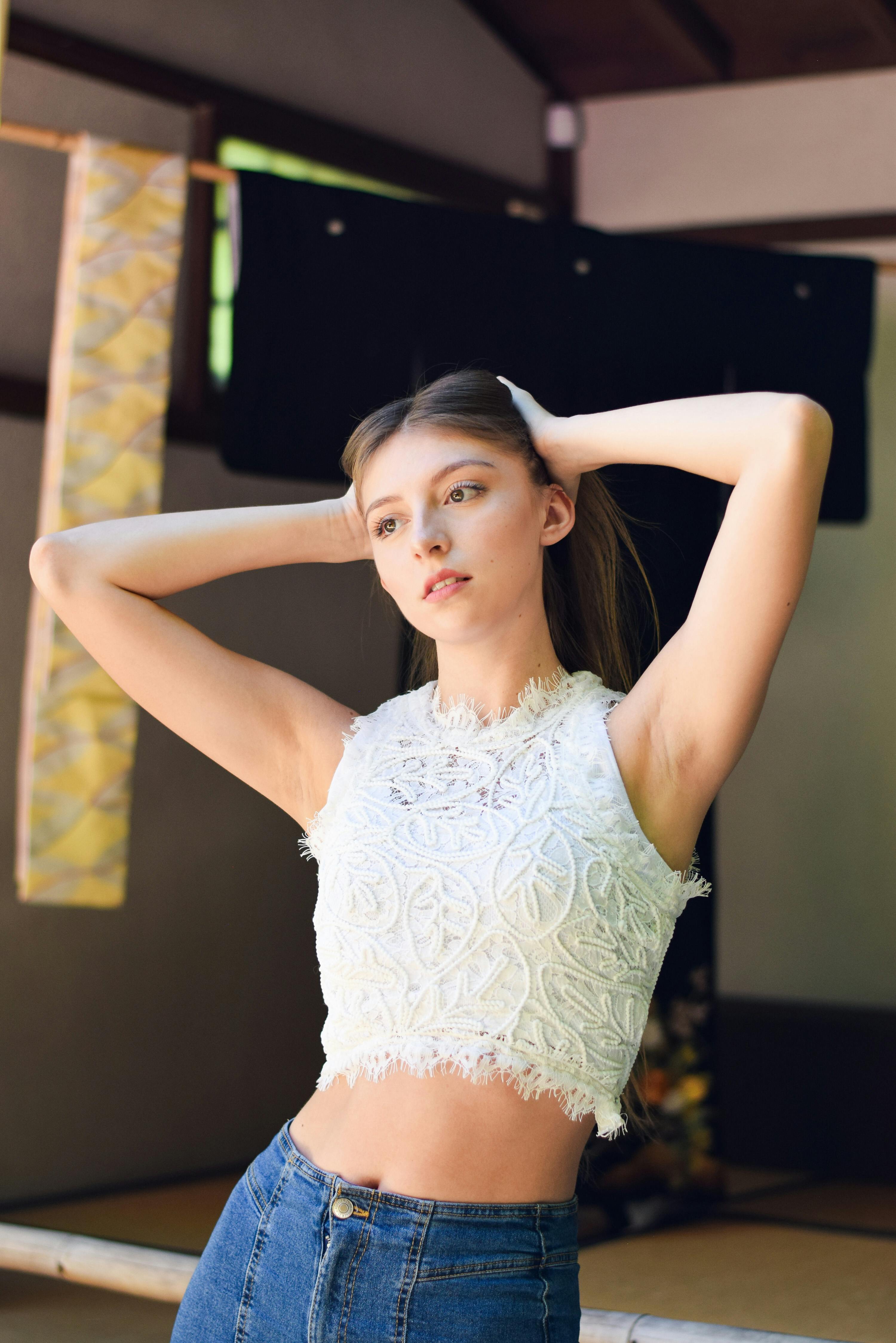 Pretty Woman in White Crop Top · Free Stock Photo