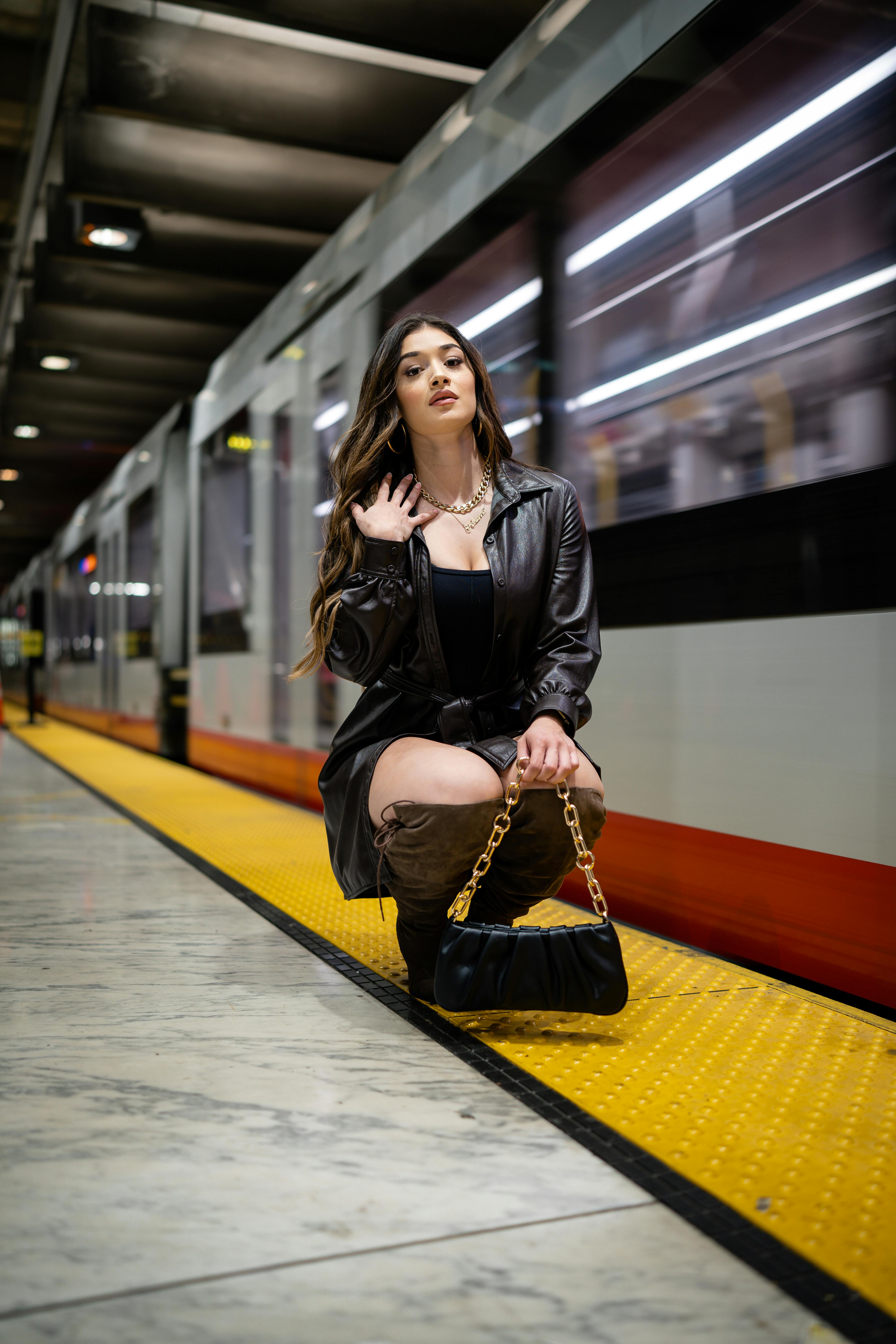 Woman Posing on Train Station Platform · Free Stock Photo