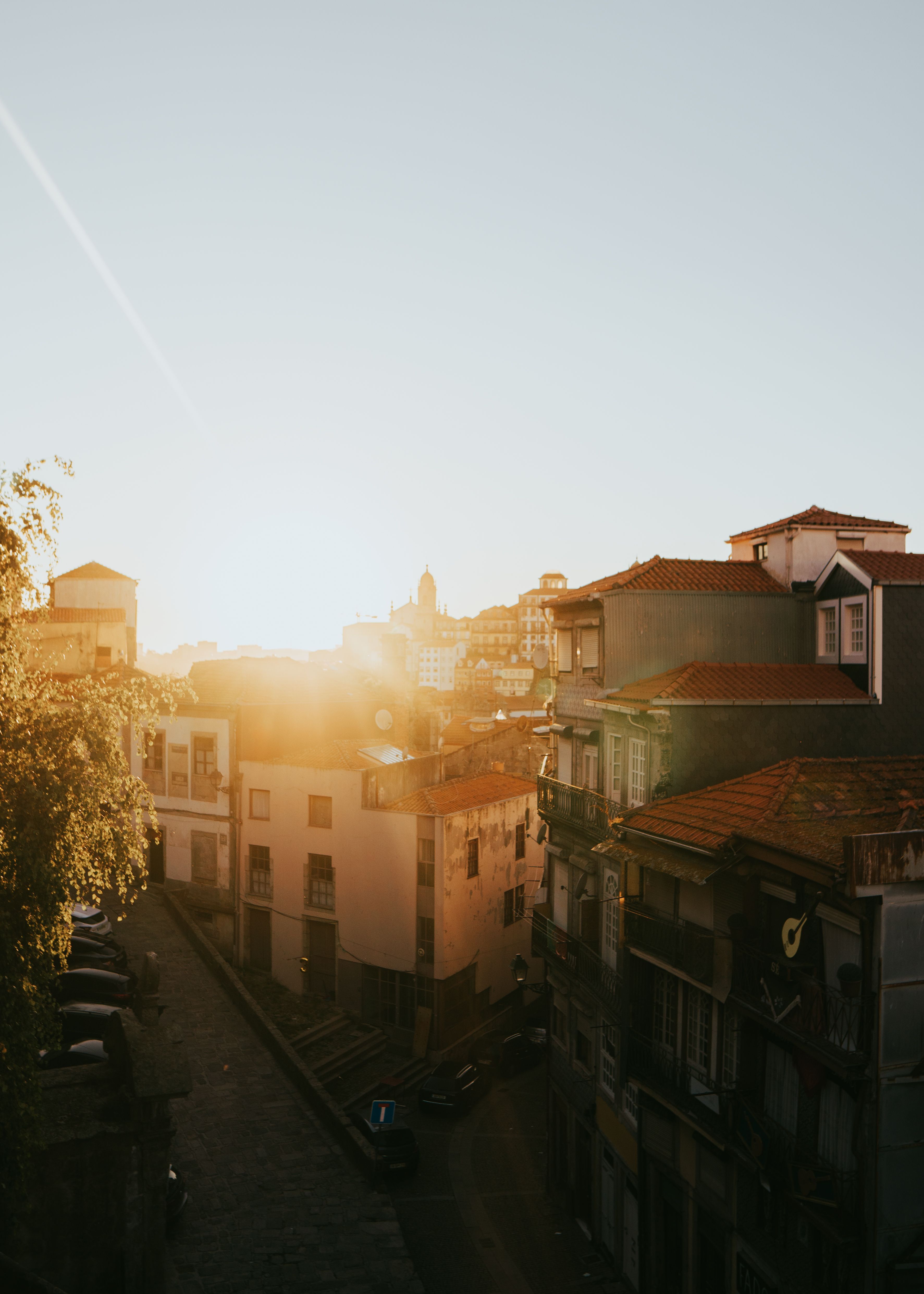 Drone Shot of Houses in a Small Town During Sunset · Free Stock Photo