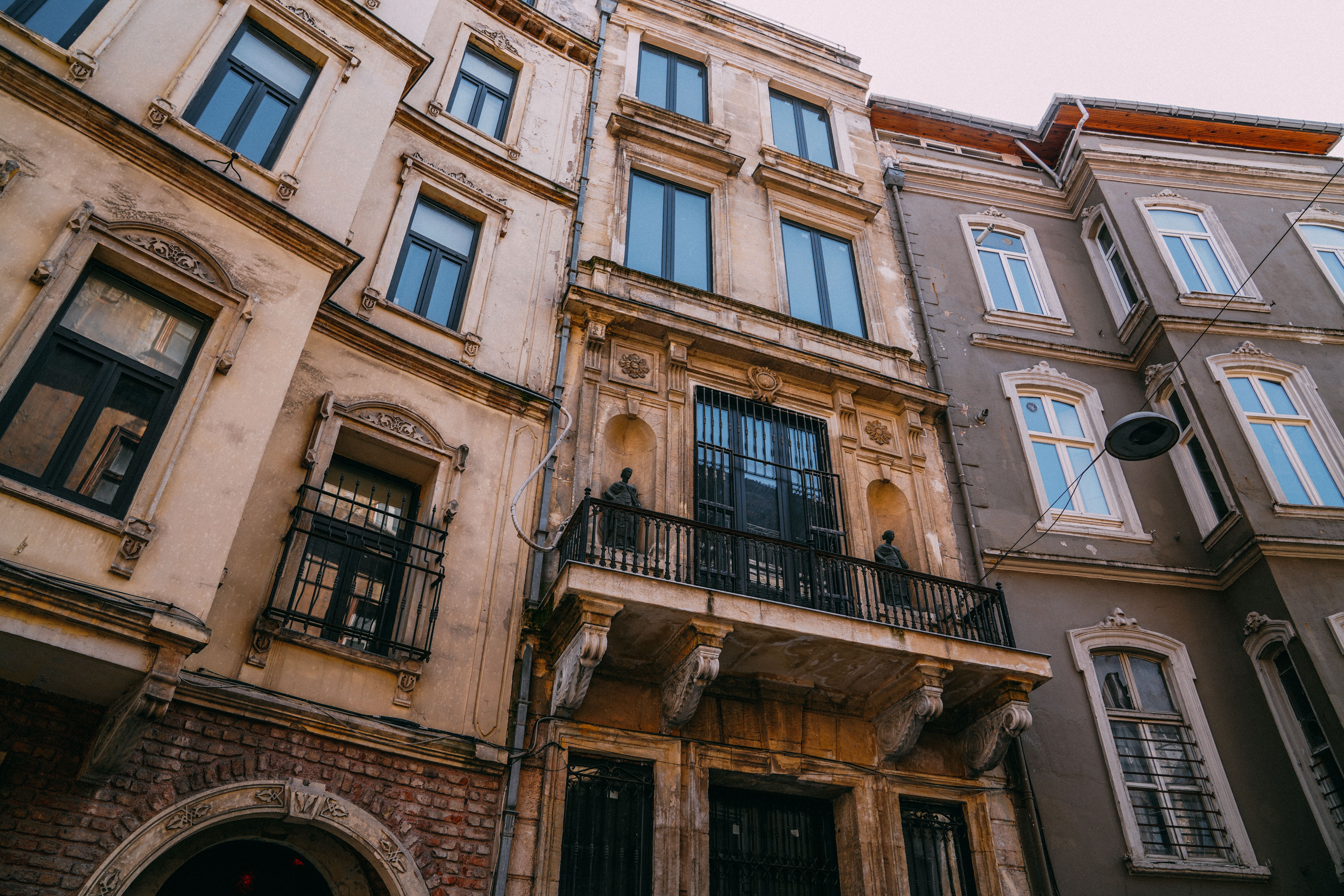 Photo of the Exterior of Buildings with Windows · Free Stock Photo