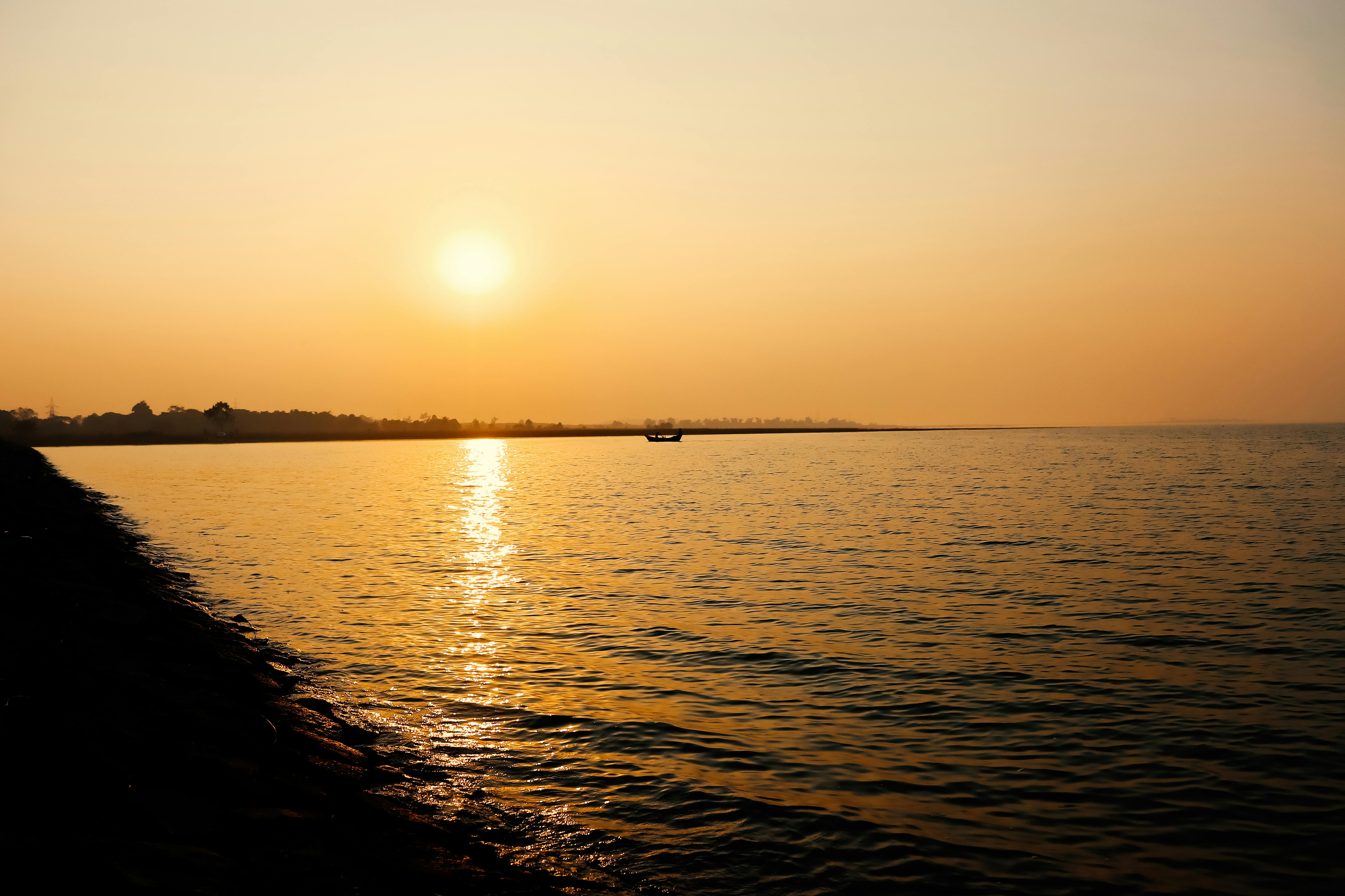 Calm Ocean During Golden Hour · Free Stock Photo