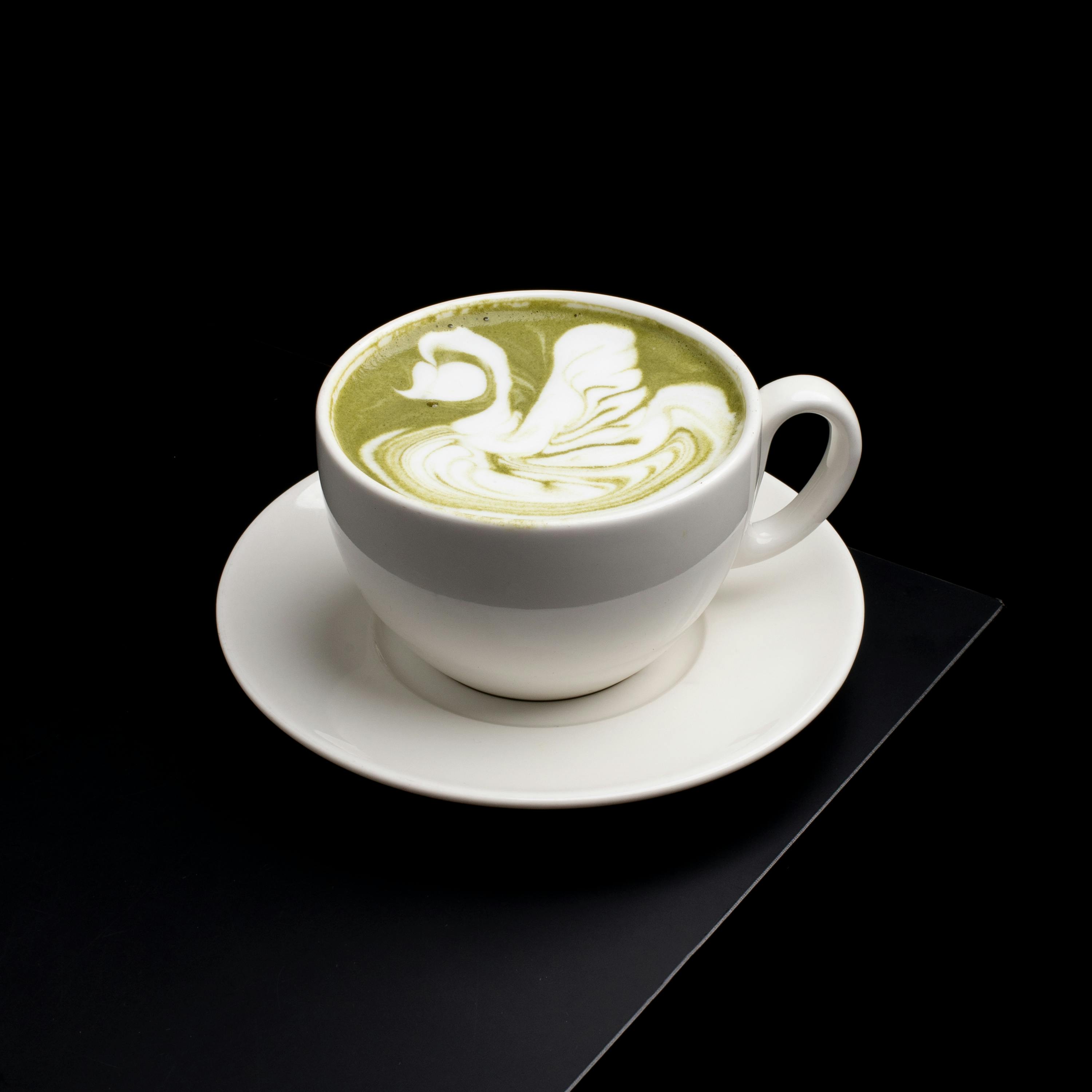 A Hot Matcha Latte on White Ceramic Cup · Free Stock Photo