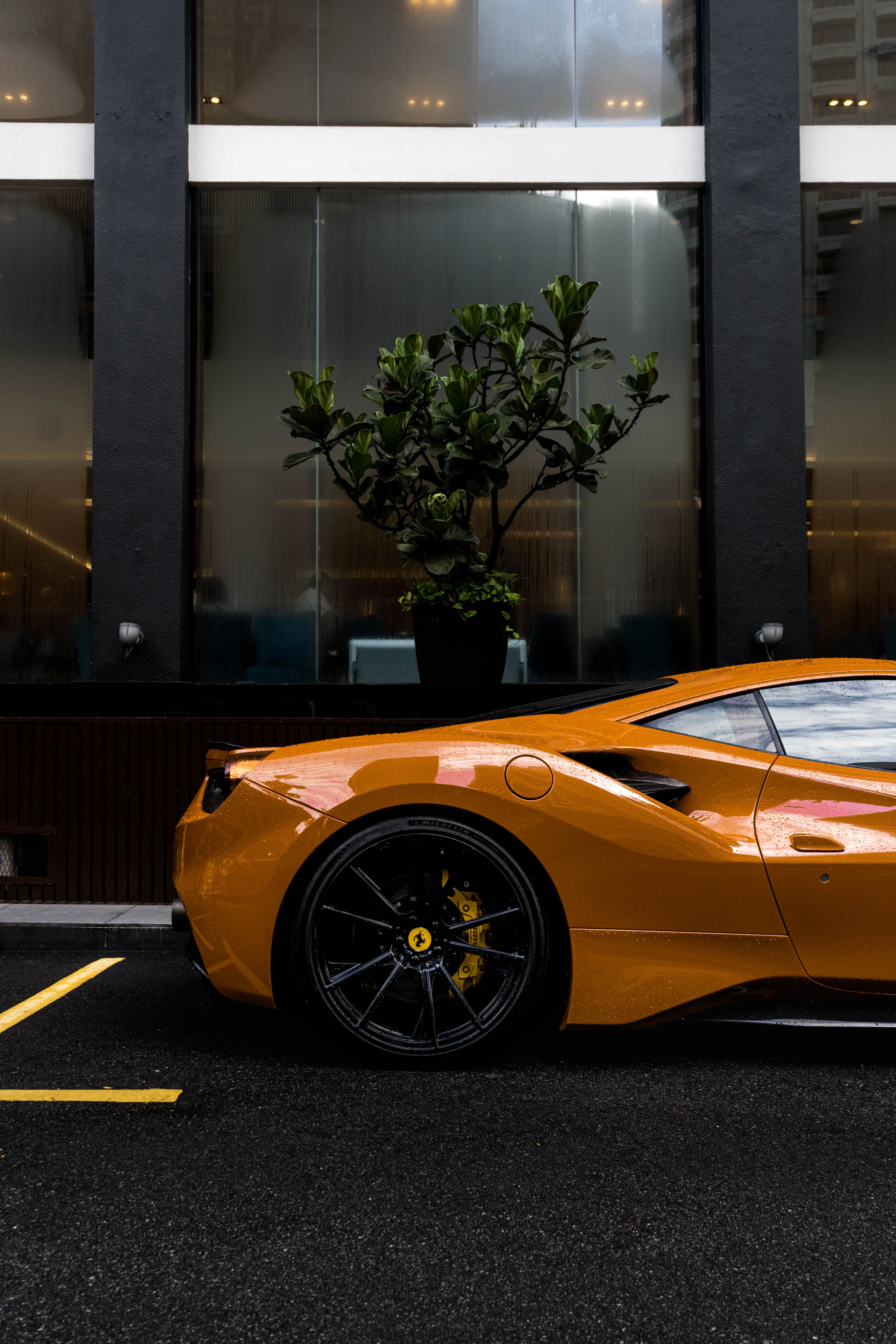 Red Ferrari Parked on Roadside · Free Stock Photo