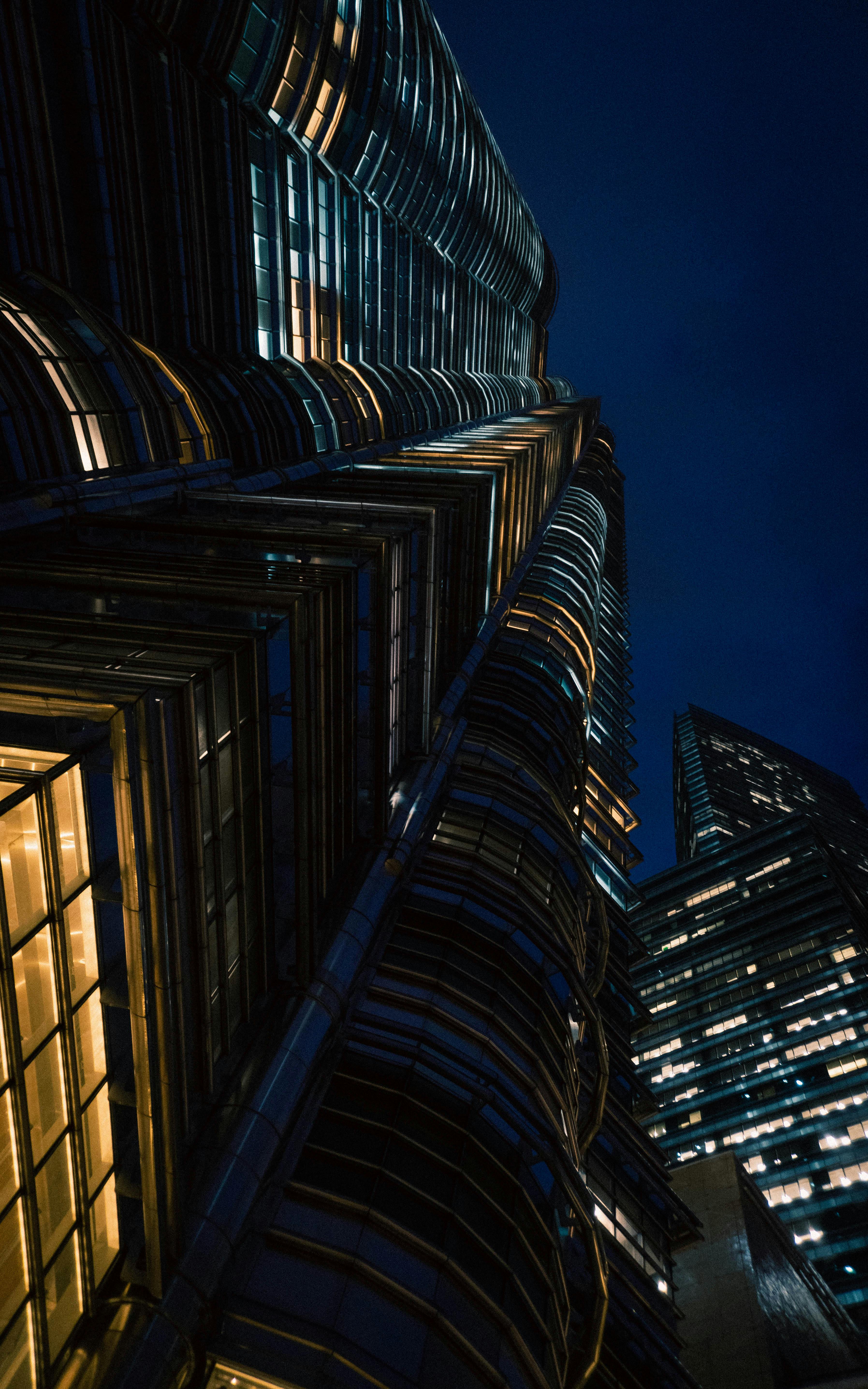 Low-Angle Shot of High Rise Buildings in the City during Nighttime ...