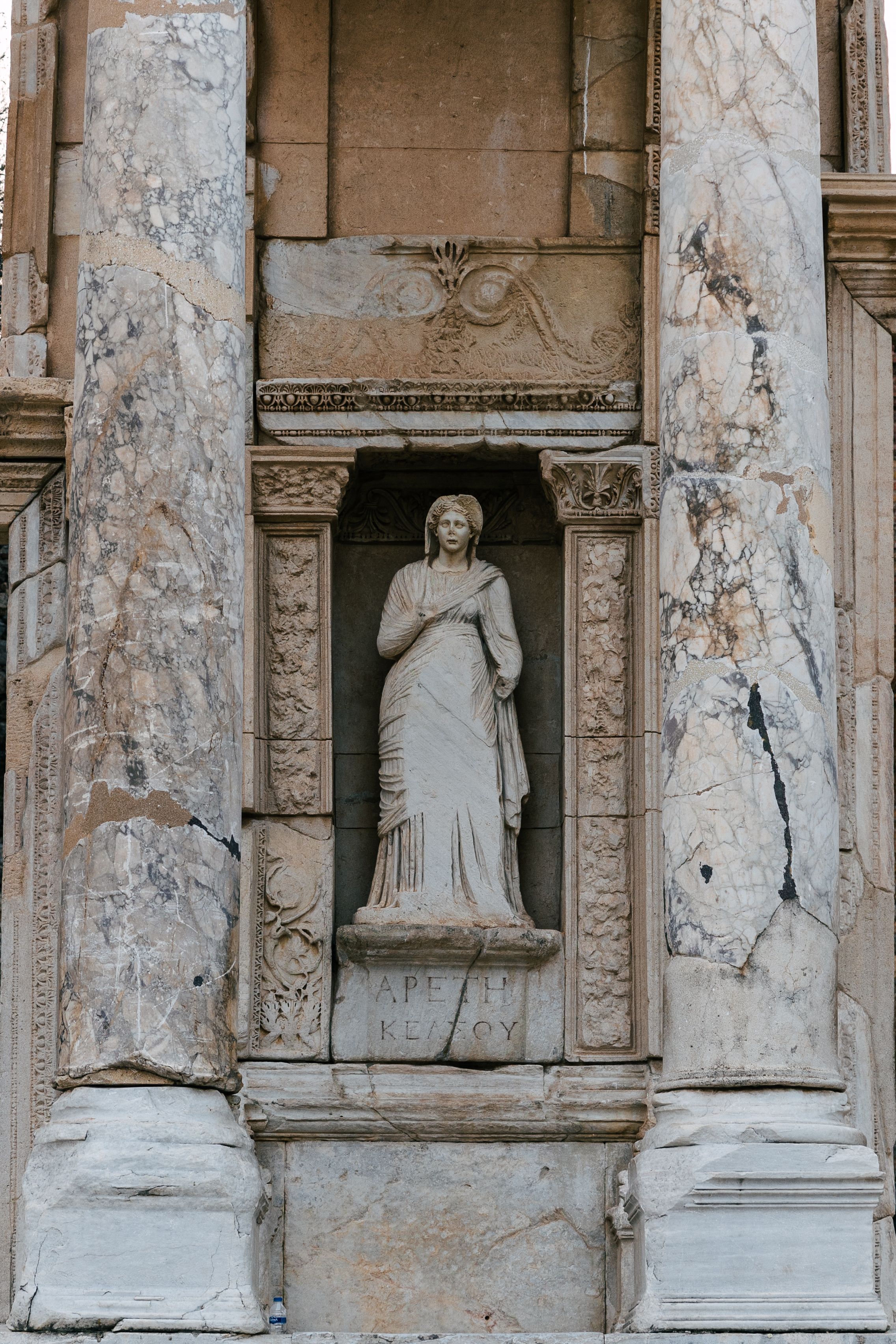 Wall of a Historic Building with a Sculpture · Free Stock Photo