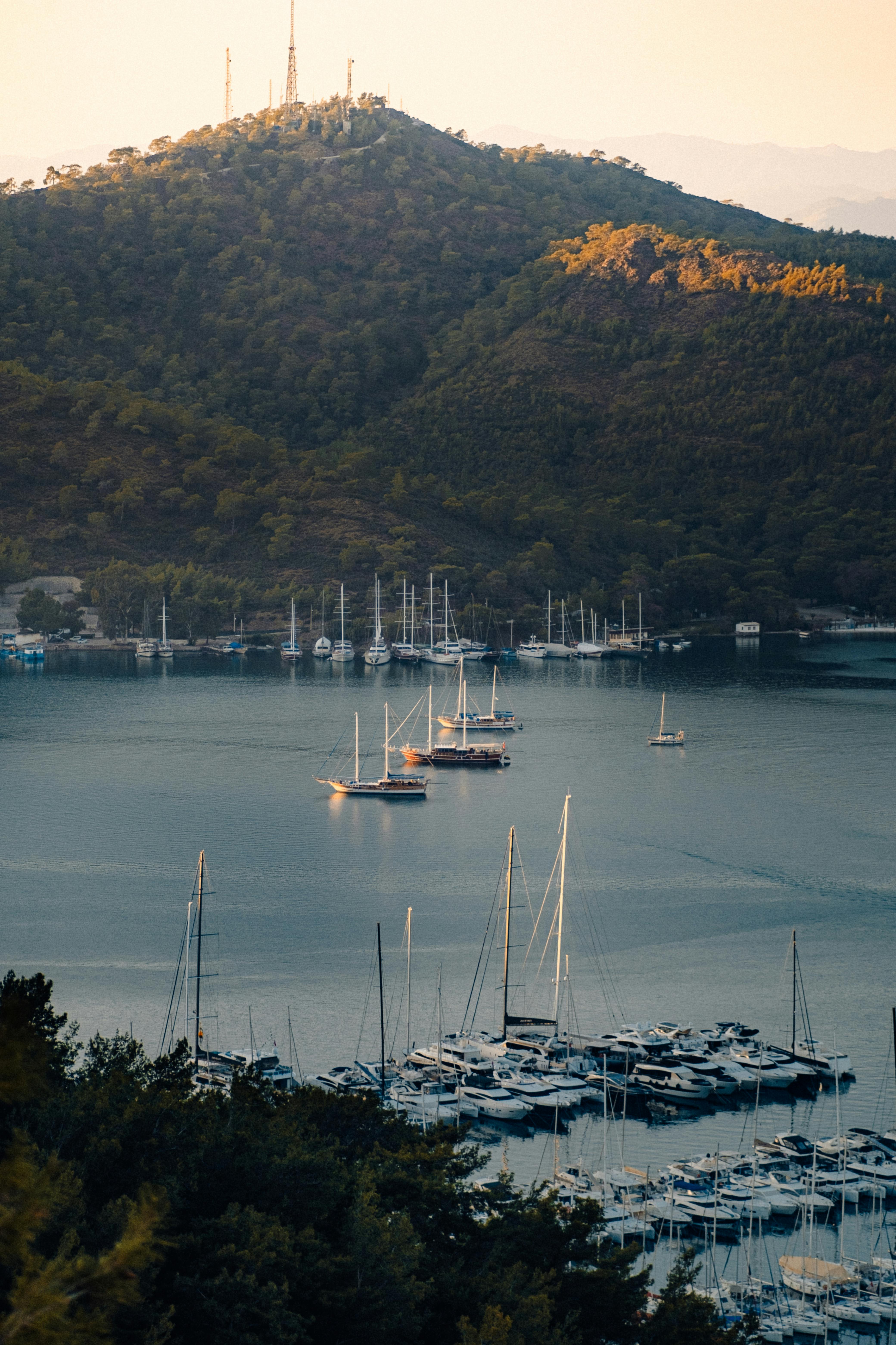 Aerial Photography of Sailing Ships on the Ocean near Mountain · Free ...