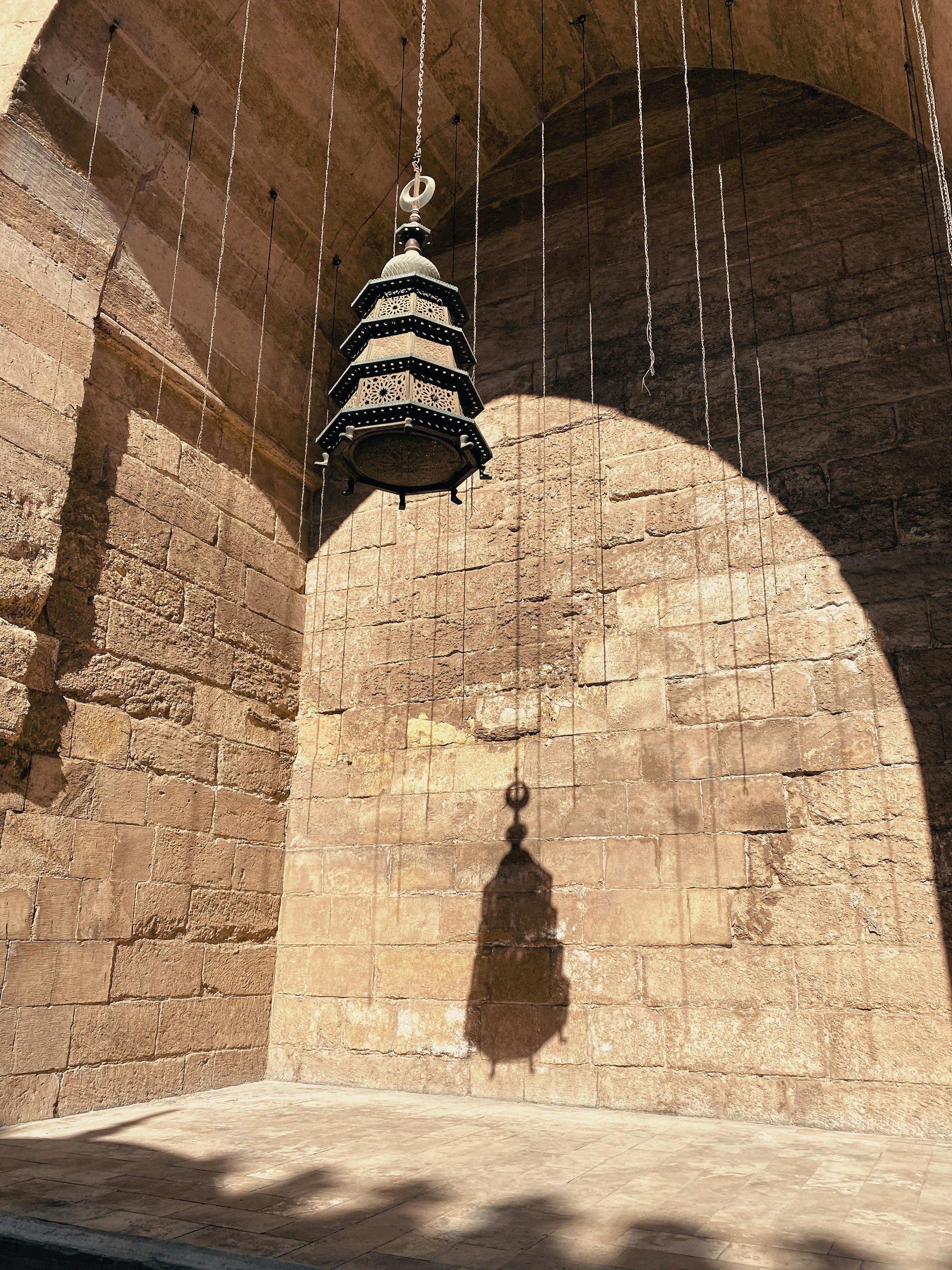 Ornamented Bell Hanging in Corner · Free Stock Photo