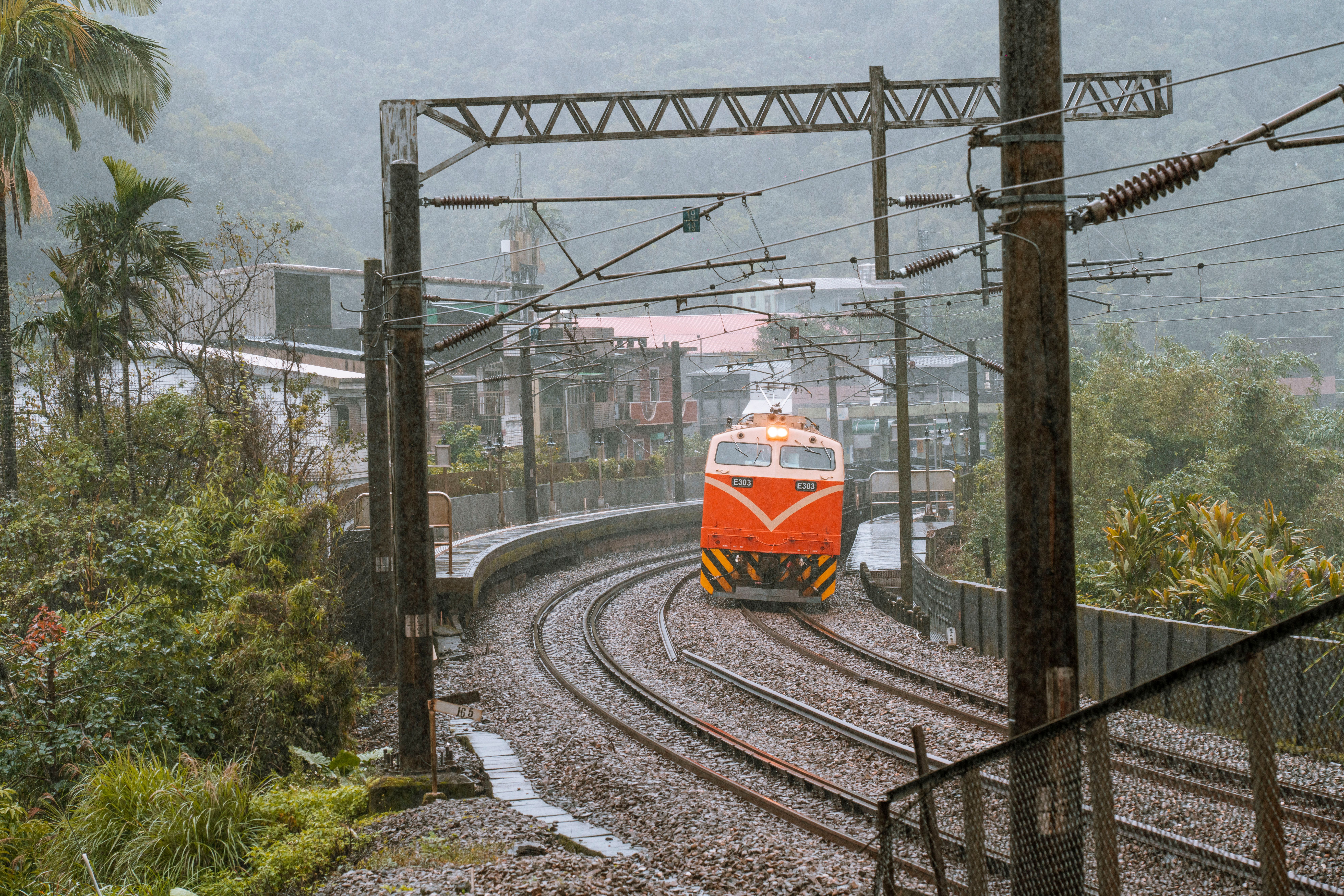 Train Riding on Railway Tracks · Free Stock Photo