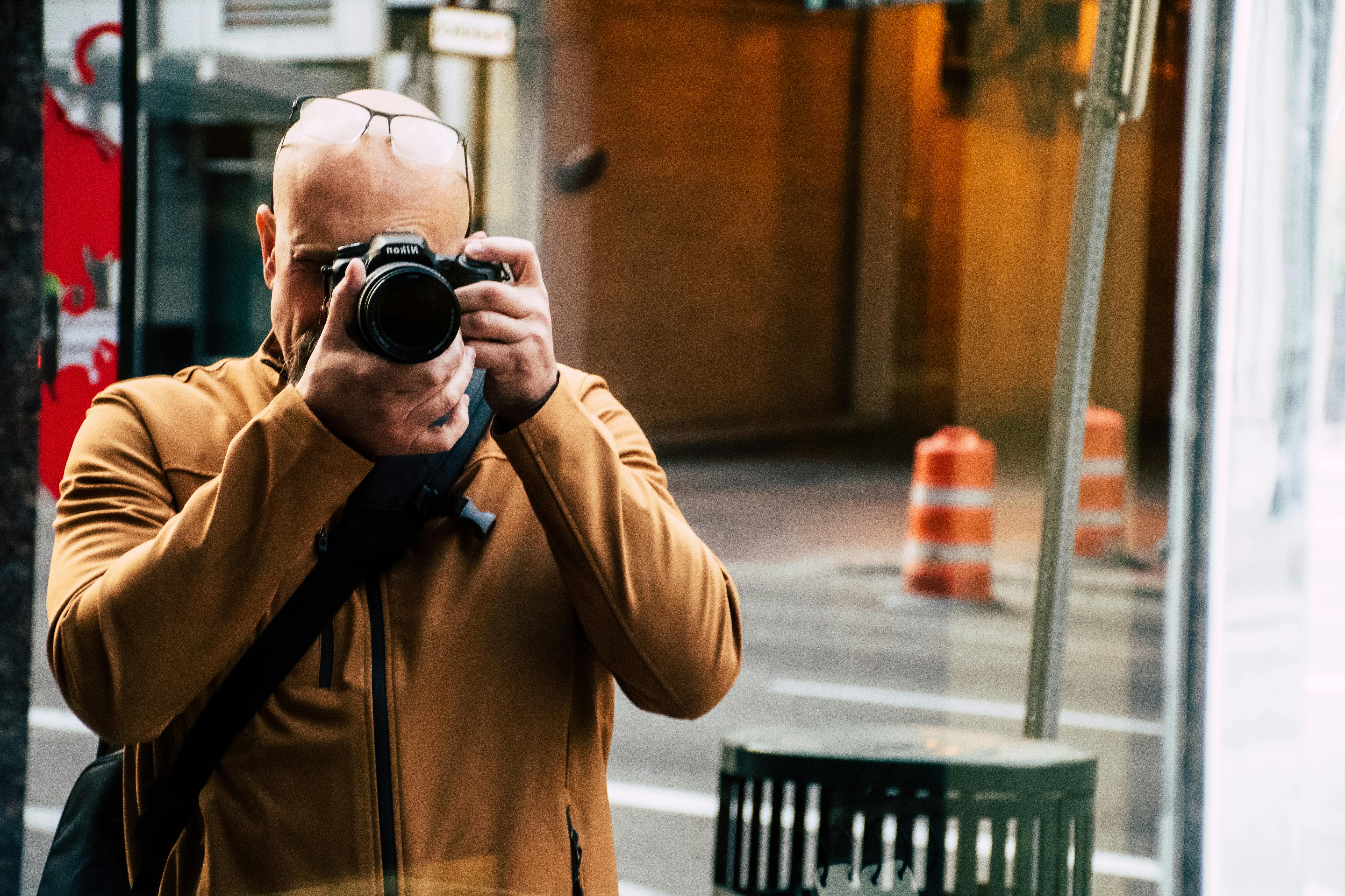Man Using Dslr Camera · Free Stock Photo
