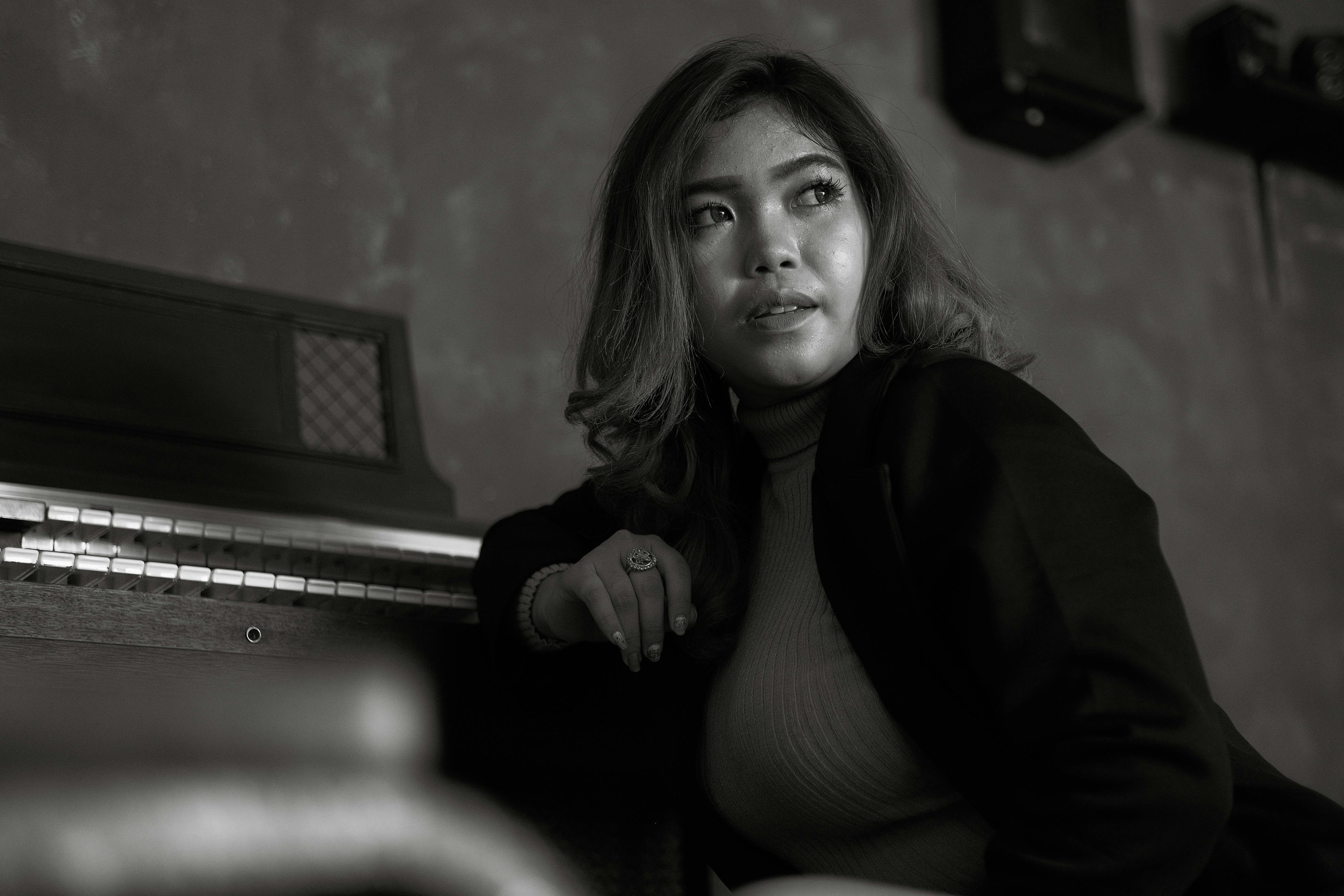 Grayscale Photo of a Woman Being Stared by a Man Inside a Room · Free ...