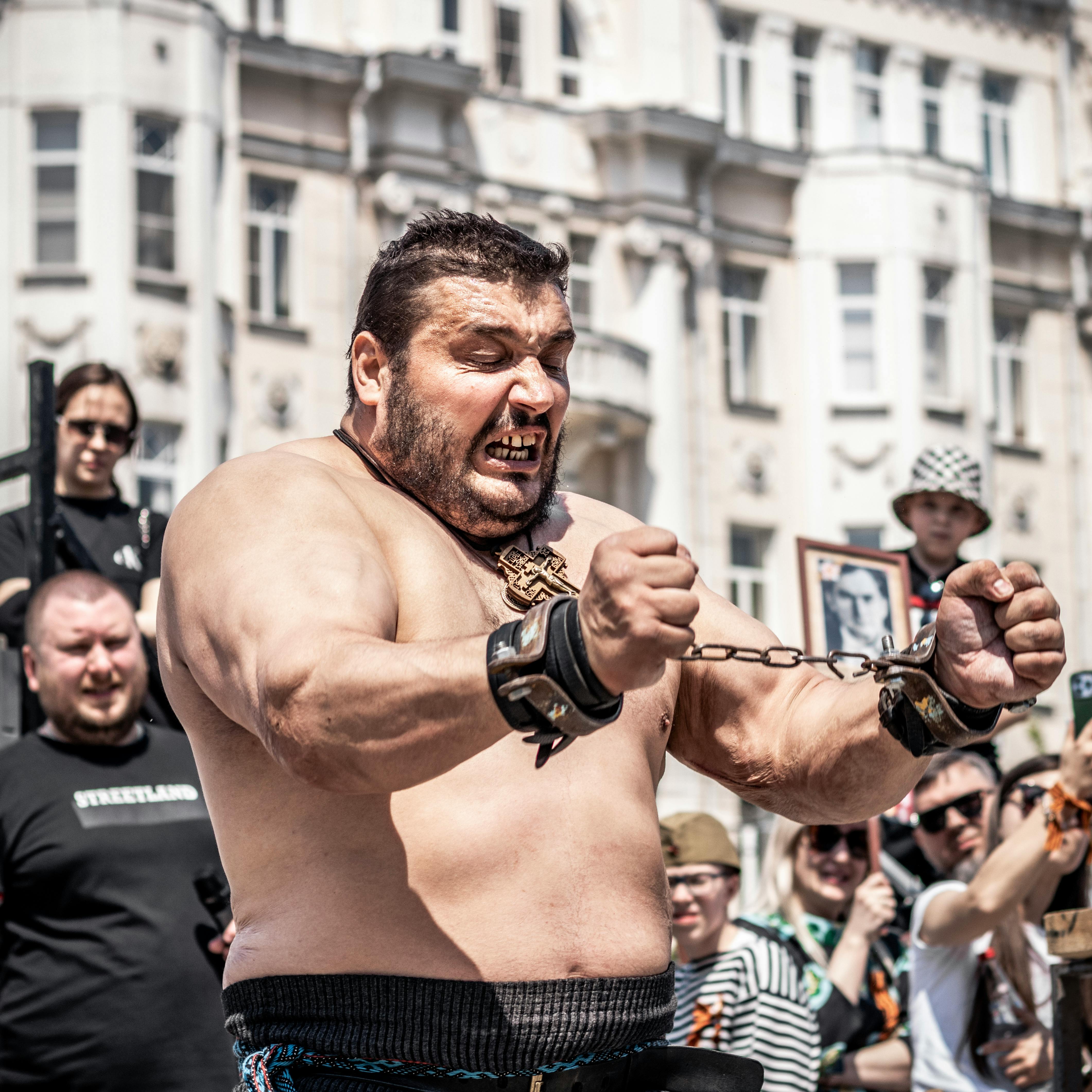 A Man Breaking a Chain · Free Stock Photo
