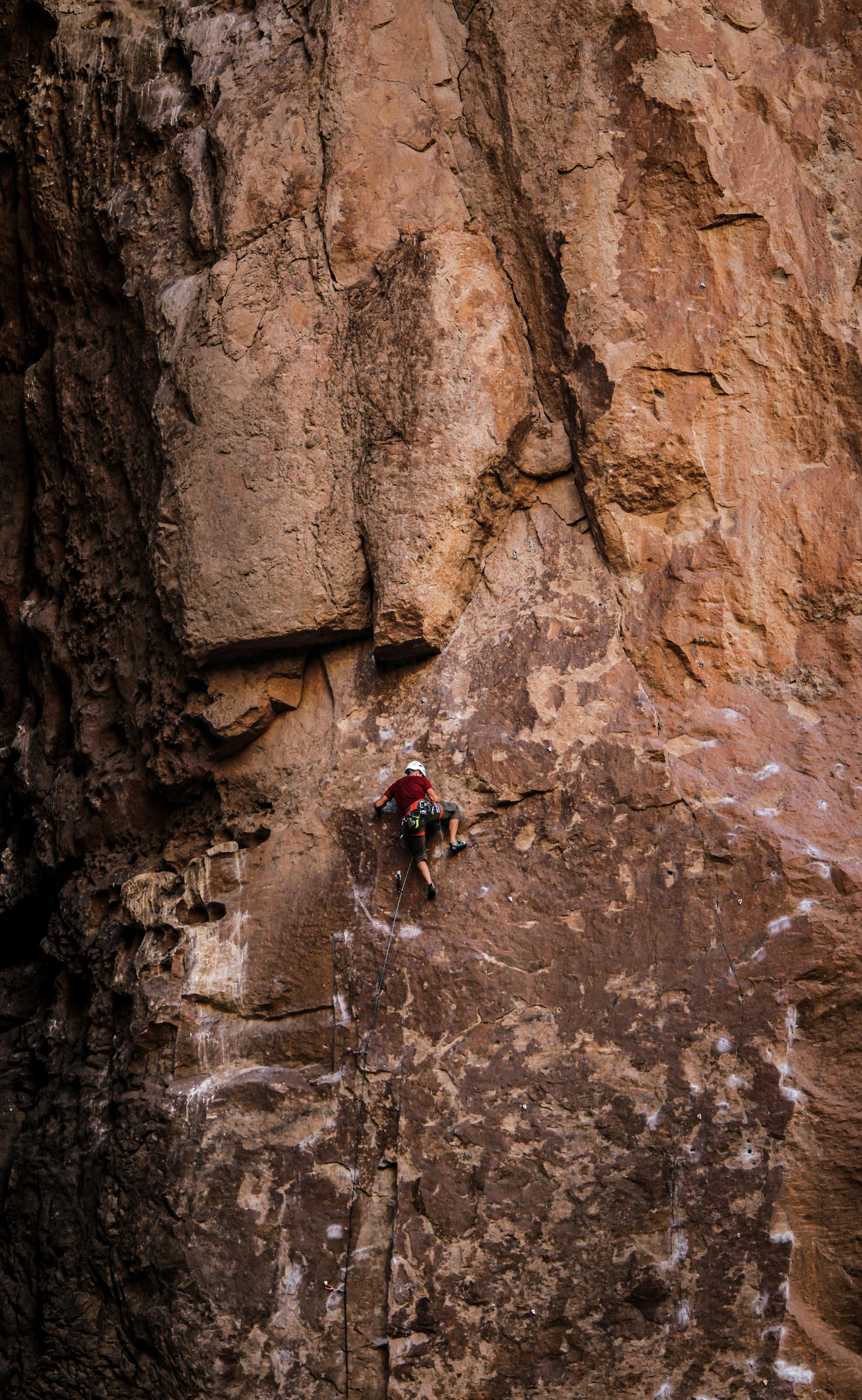 Silhouette of Man Walking Between Two Cliff · Free Stock Photo