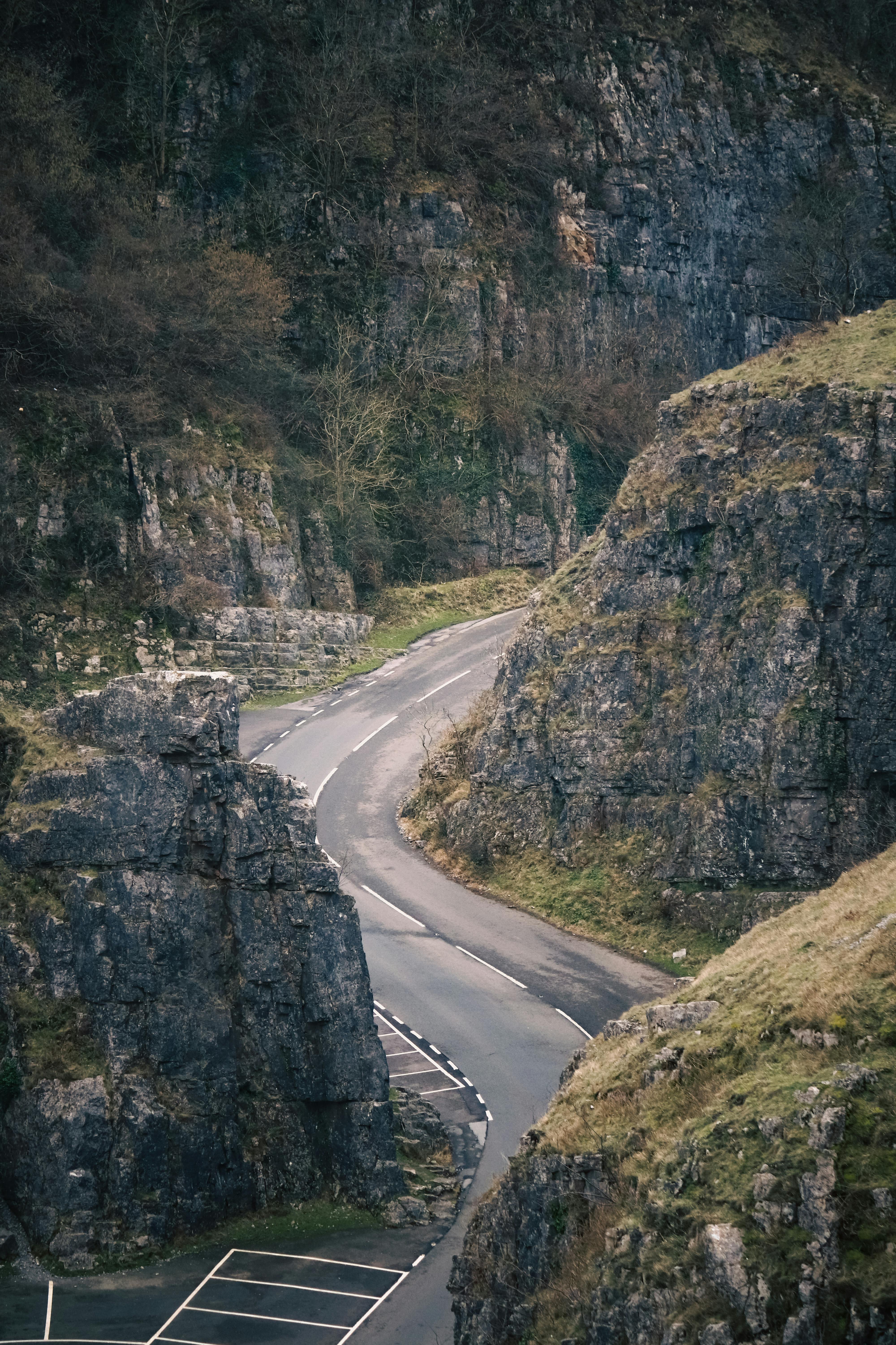 Brown Rocky Mountain Near River · Free Stock Photo