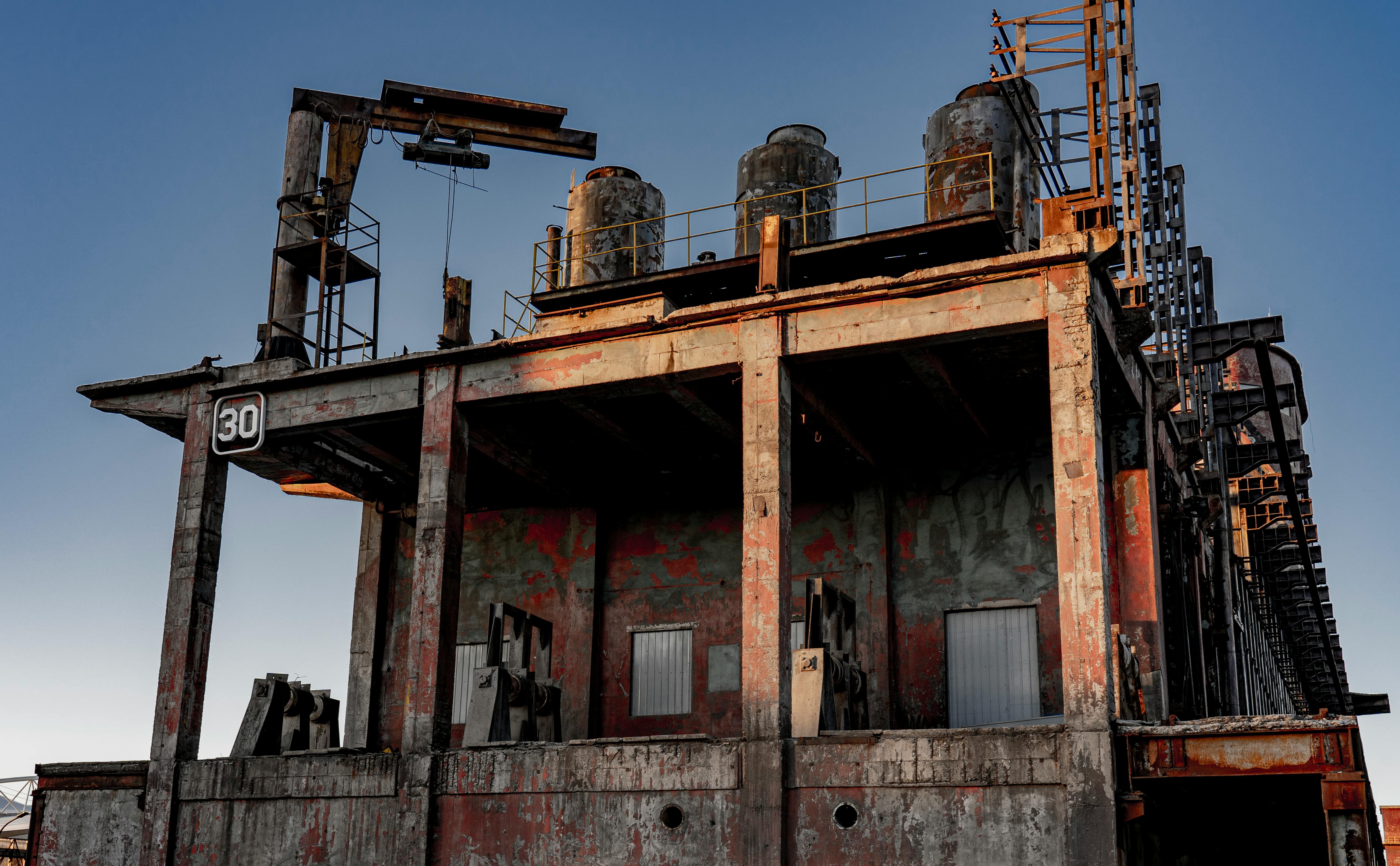 Old Rusty Plant against Blue Sky · Free Stock Photo