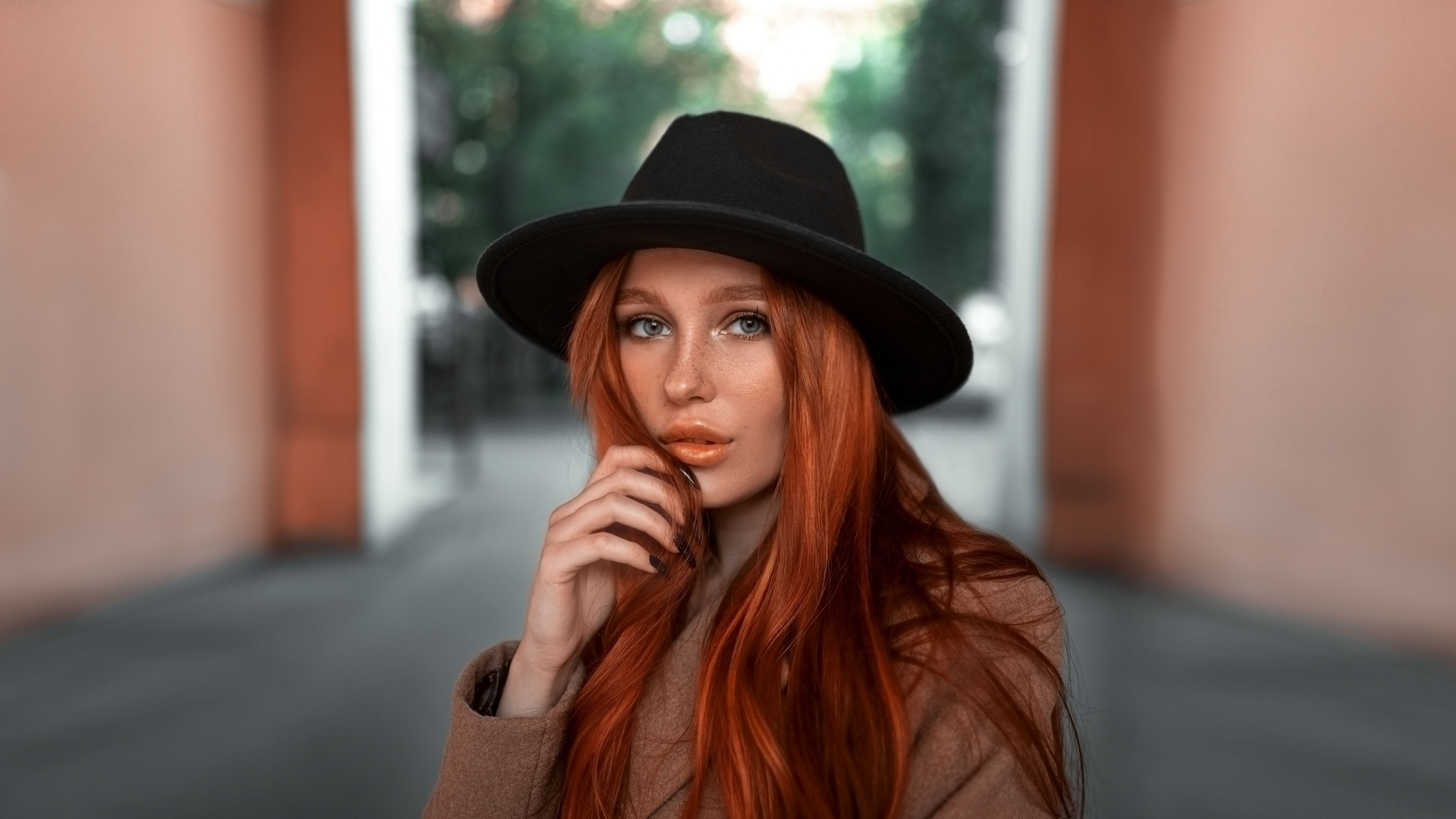 A Woman in Black Hat Looking with a Serious Face · Free Stock Photo
