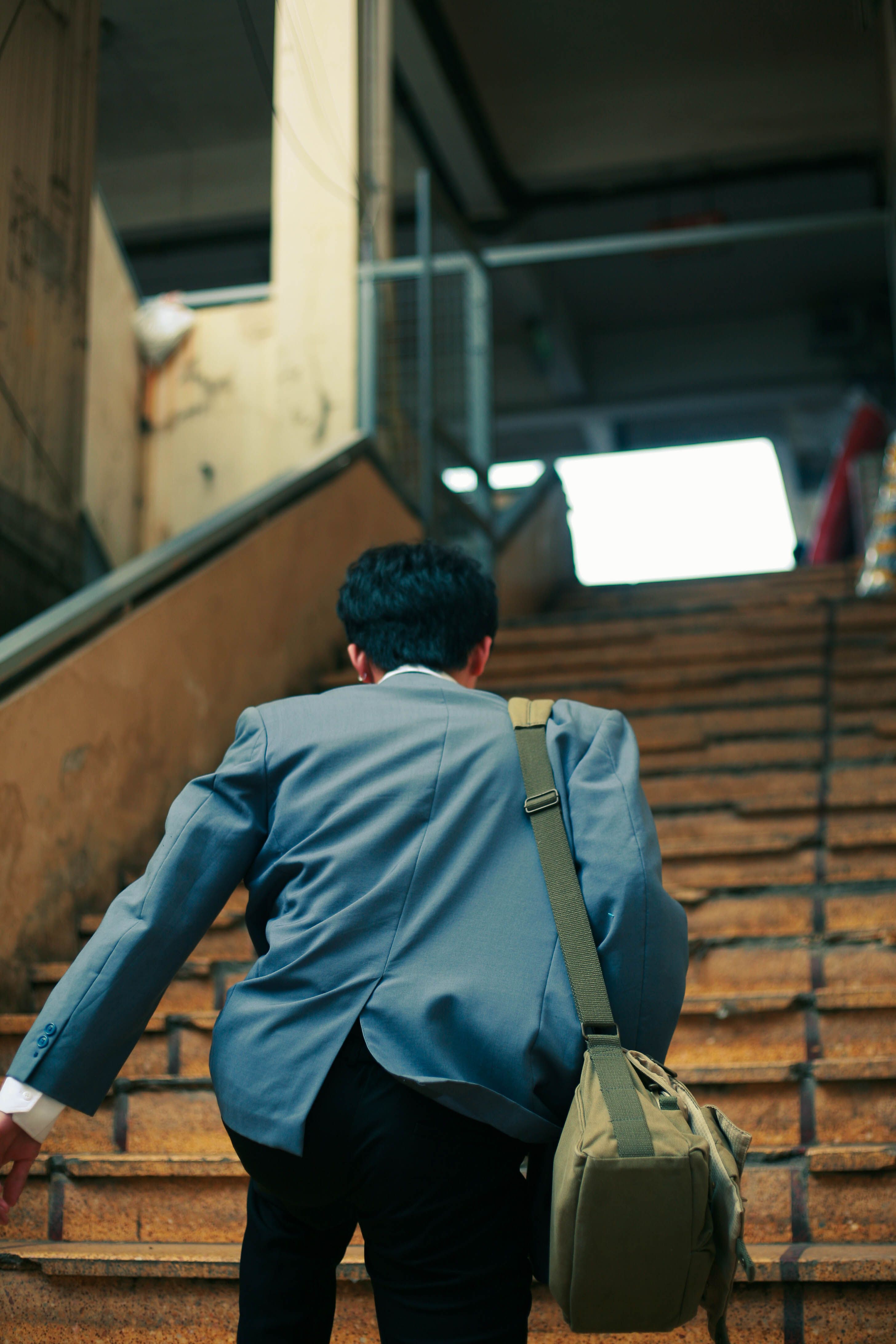 Man Walking Upstairs · Free Stock Photo