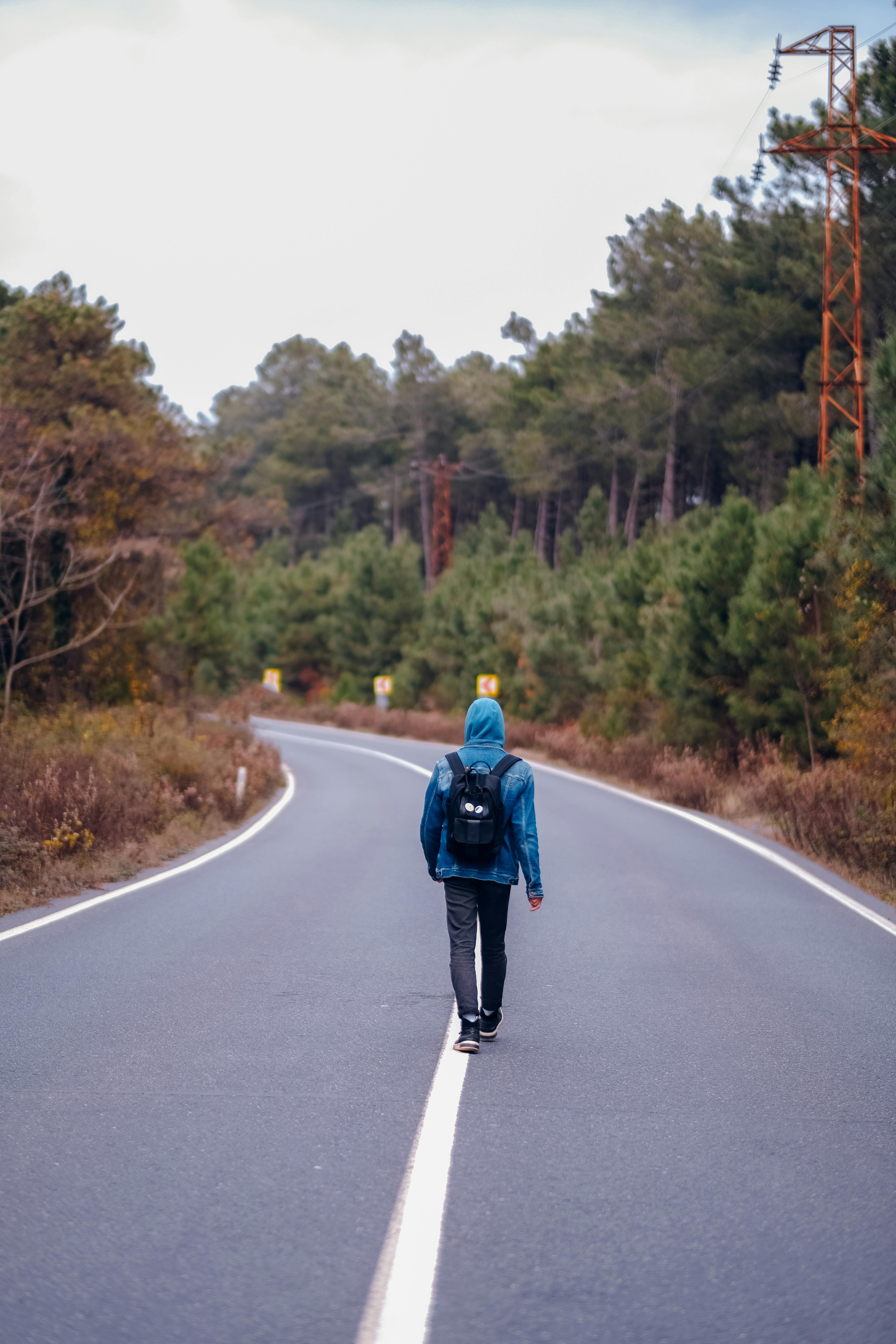 Man Carrying a Backpack · Free Stock Photo