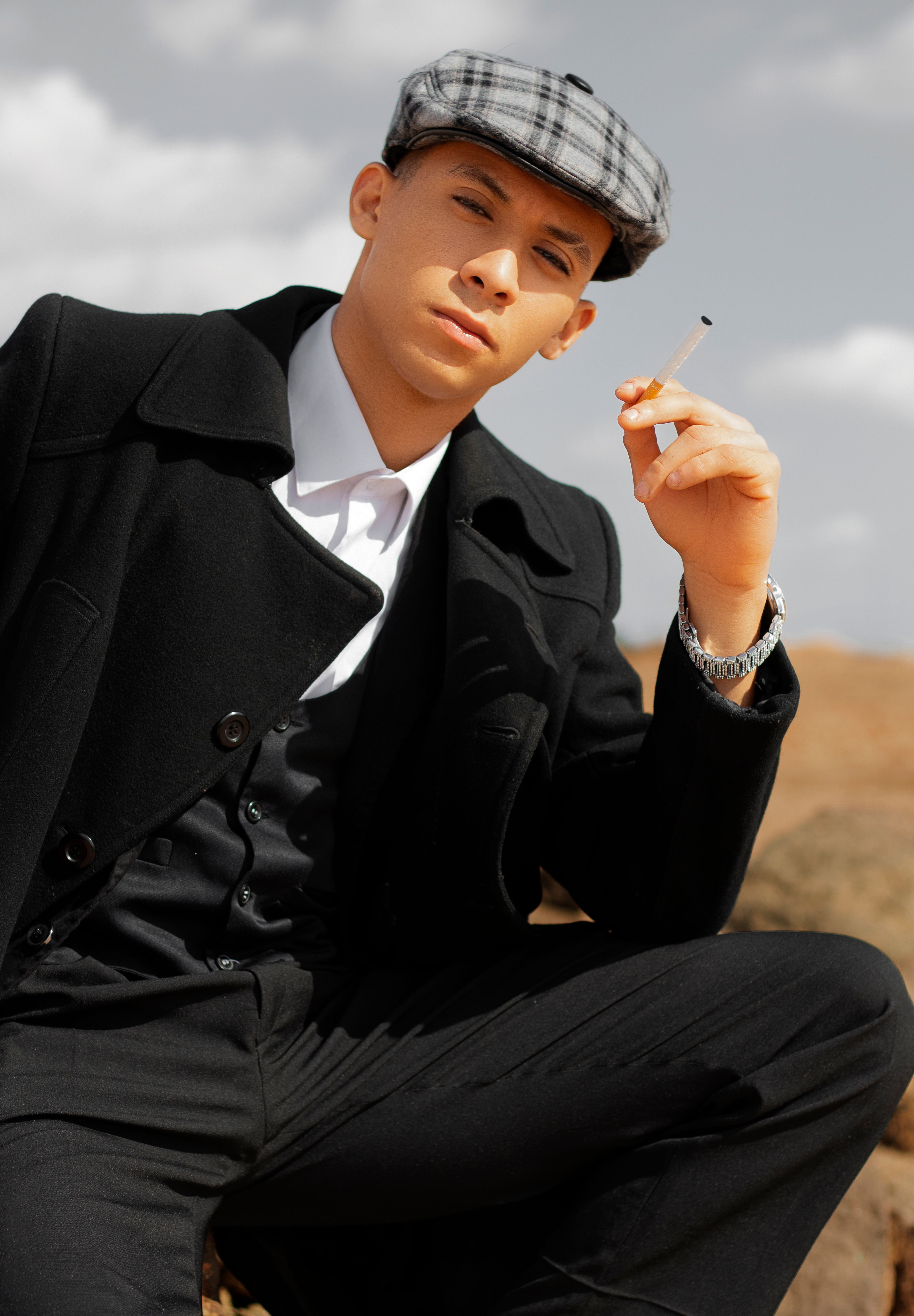 Man in Black Suit and Newsboy Cap · Free Stock Photo