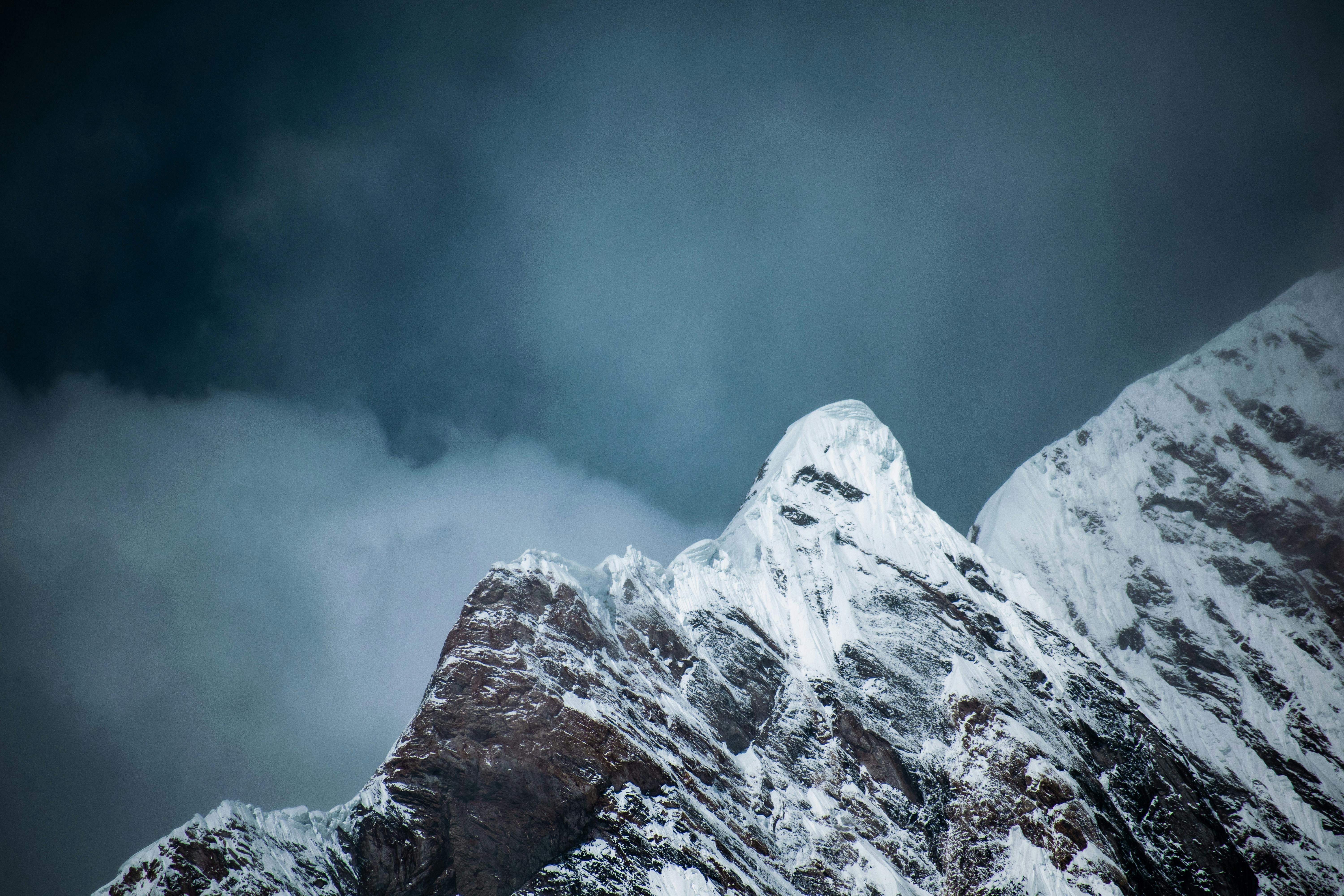 Brown Rock Mountains with Snow · Free Stock Photo