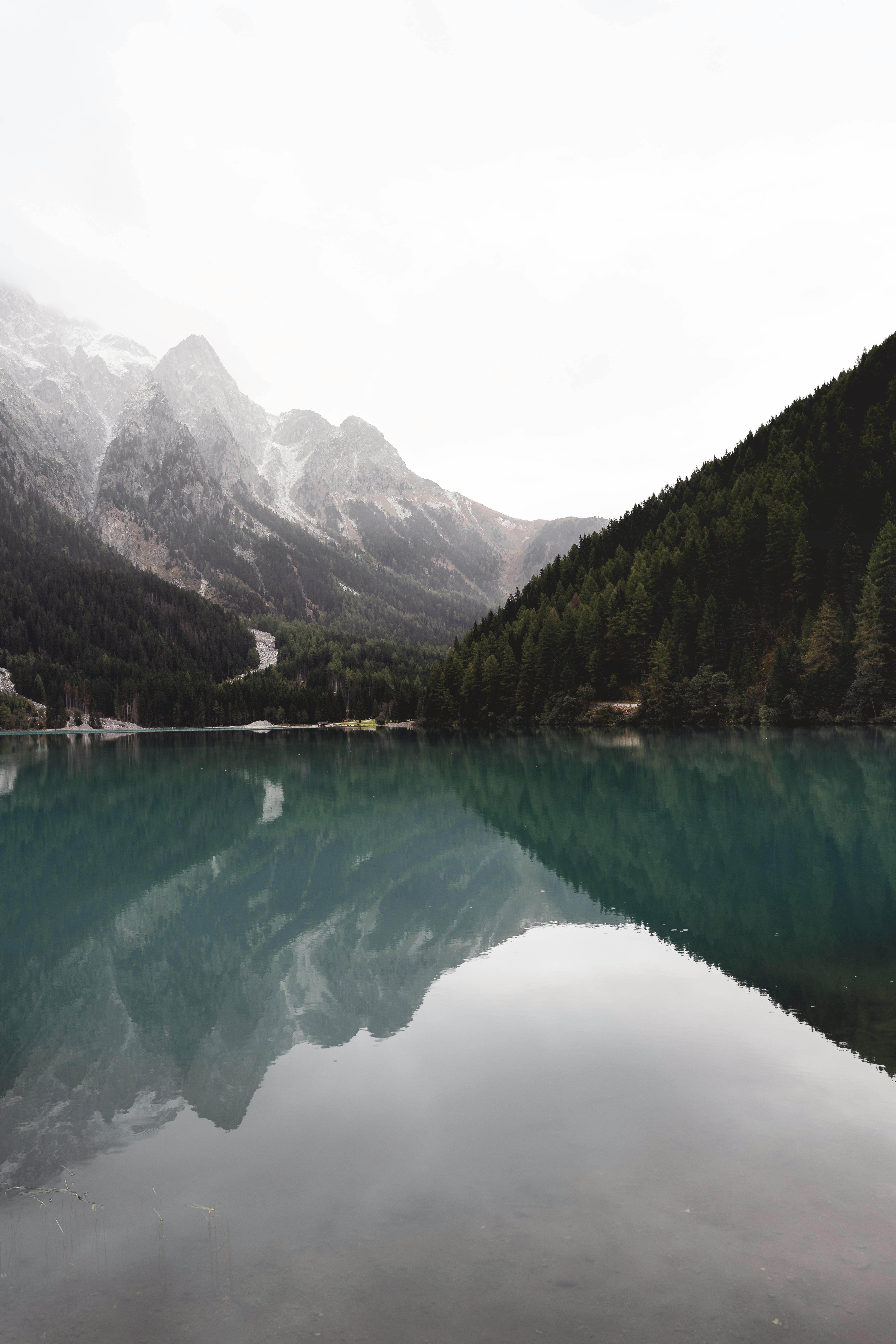 Scenic Landscape Reflecting in Water · Free Stock Photo