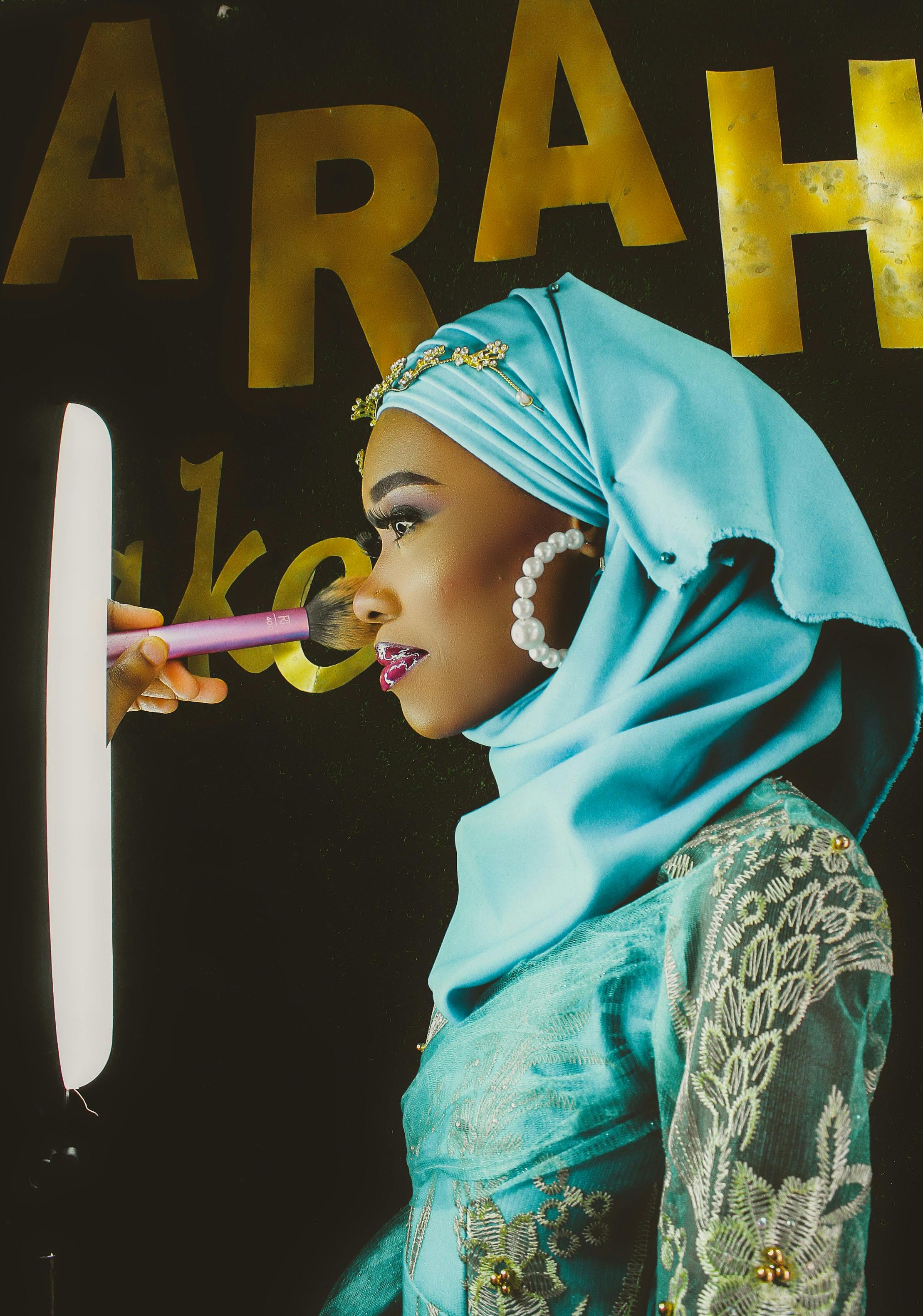 Young Man Holding a Ring Light around His Neck · Free Stock Photo