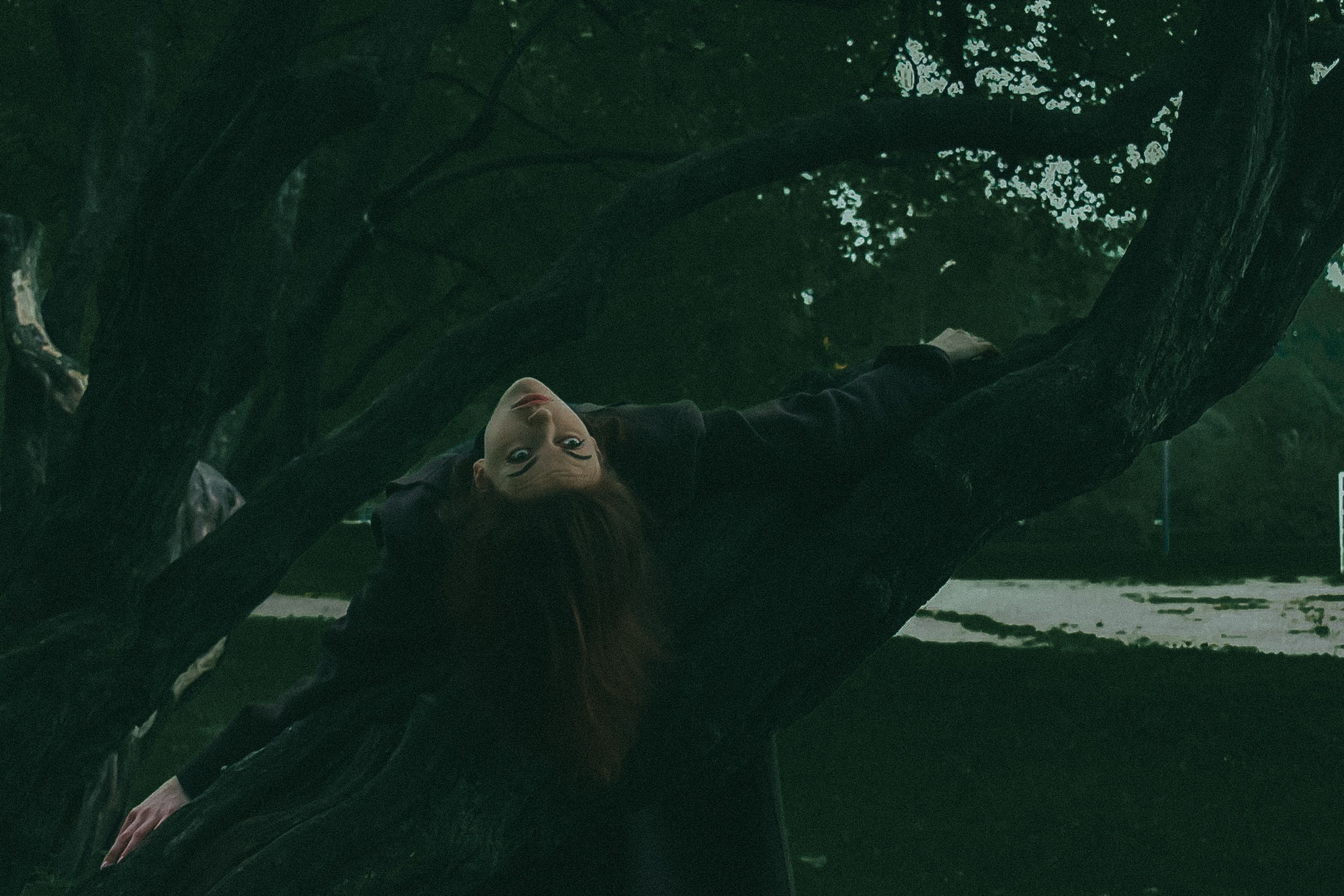 Woman Leaning on a Tree · Free Stock Photo