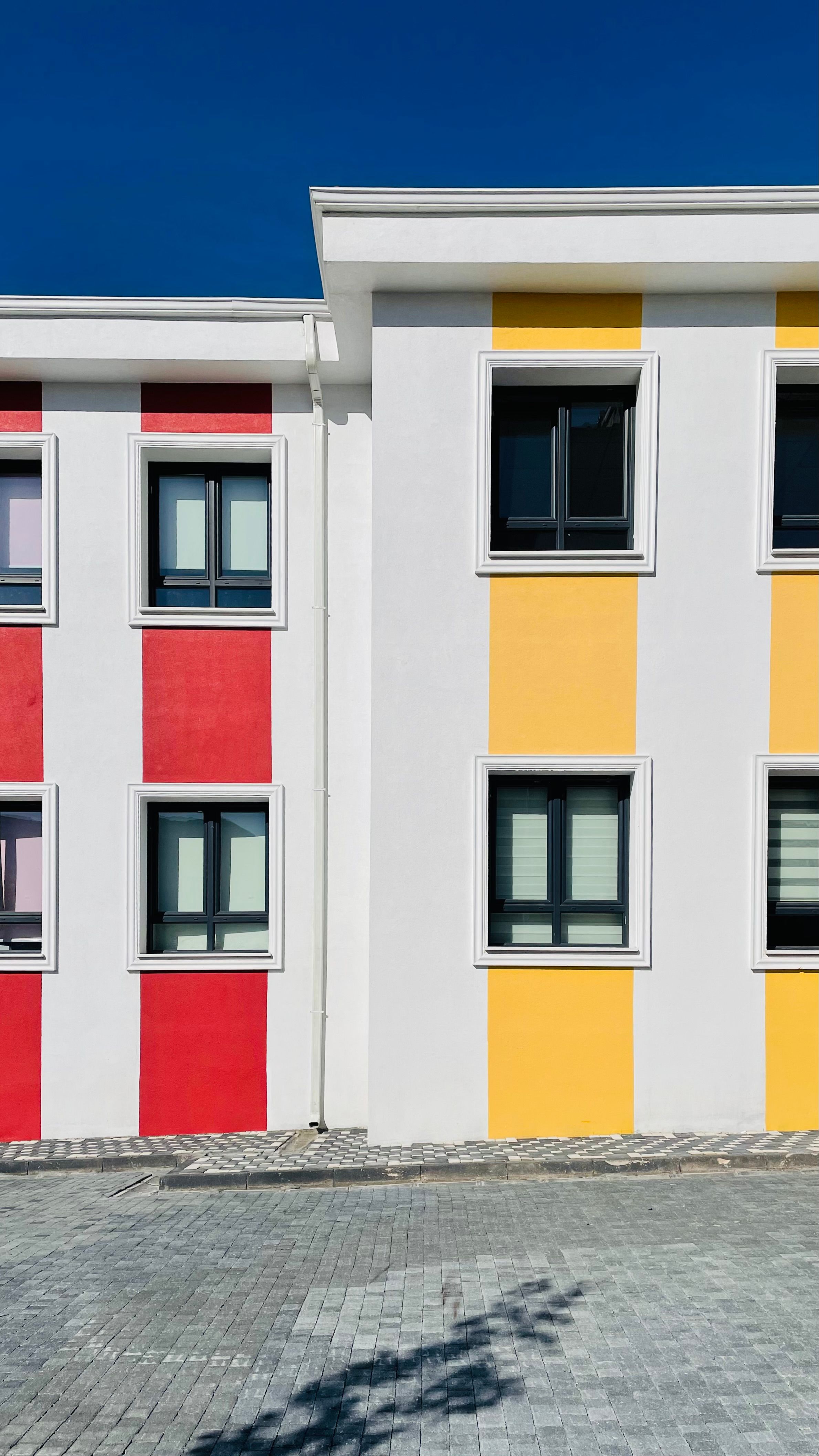 Green and Orange Building · Free Stock Photo