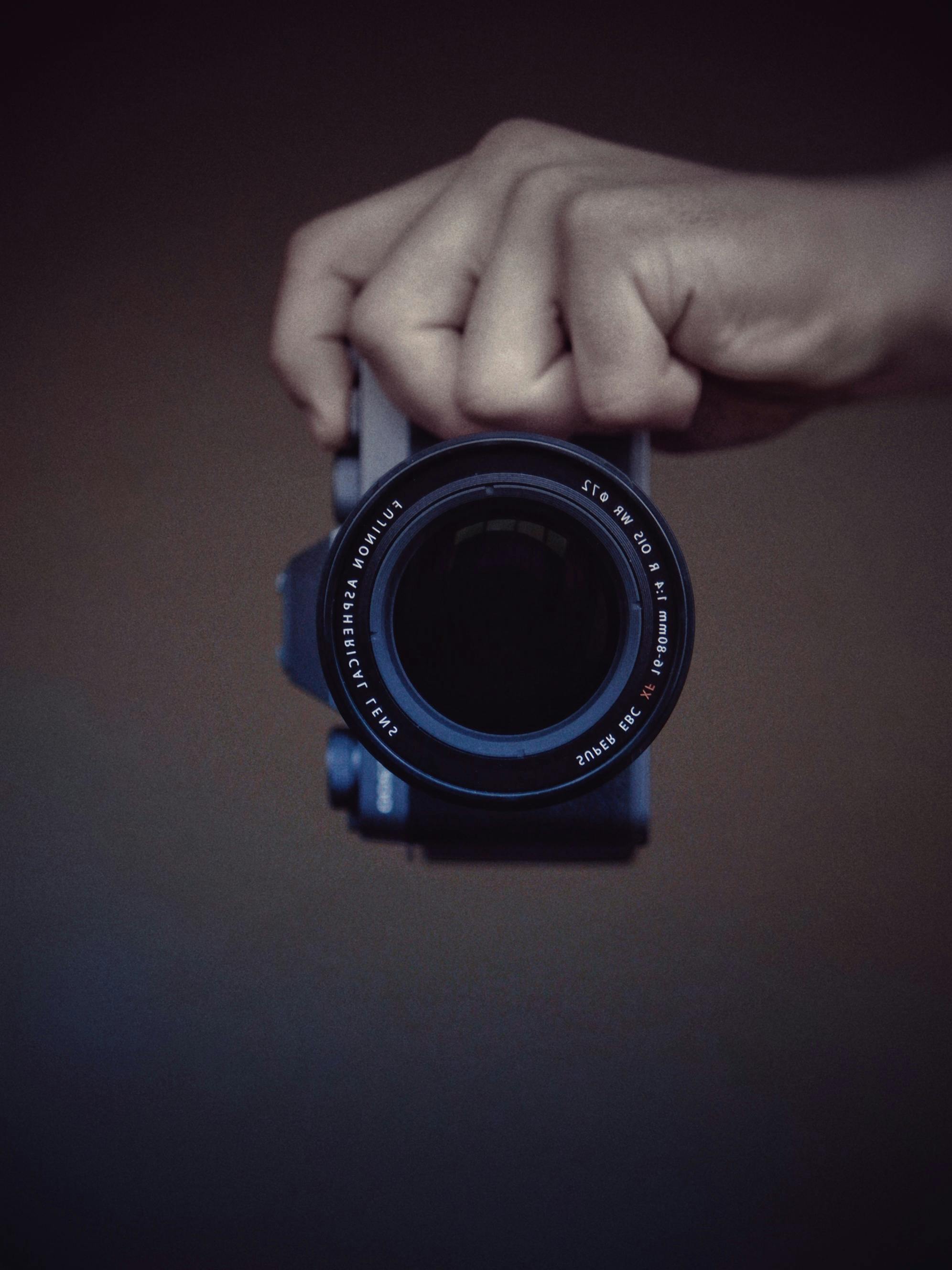 A Person holding Camera · Free Stock Photo