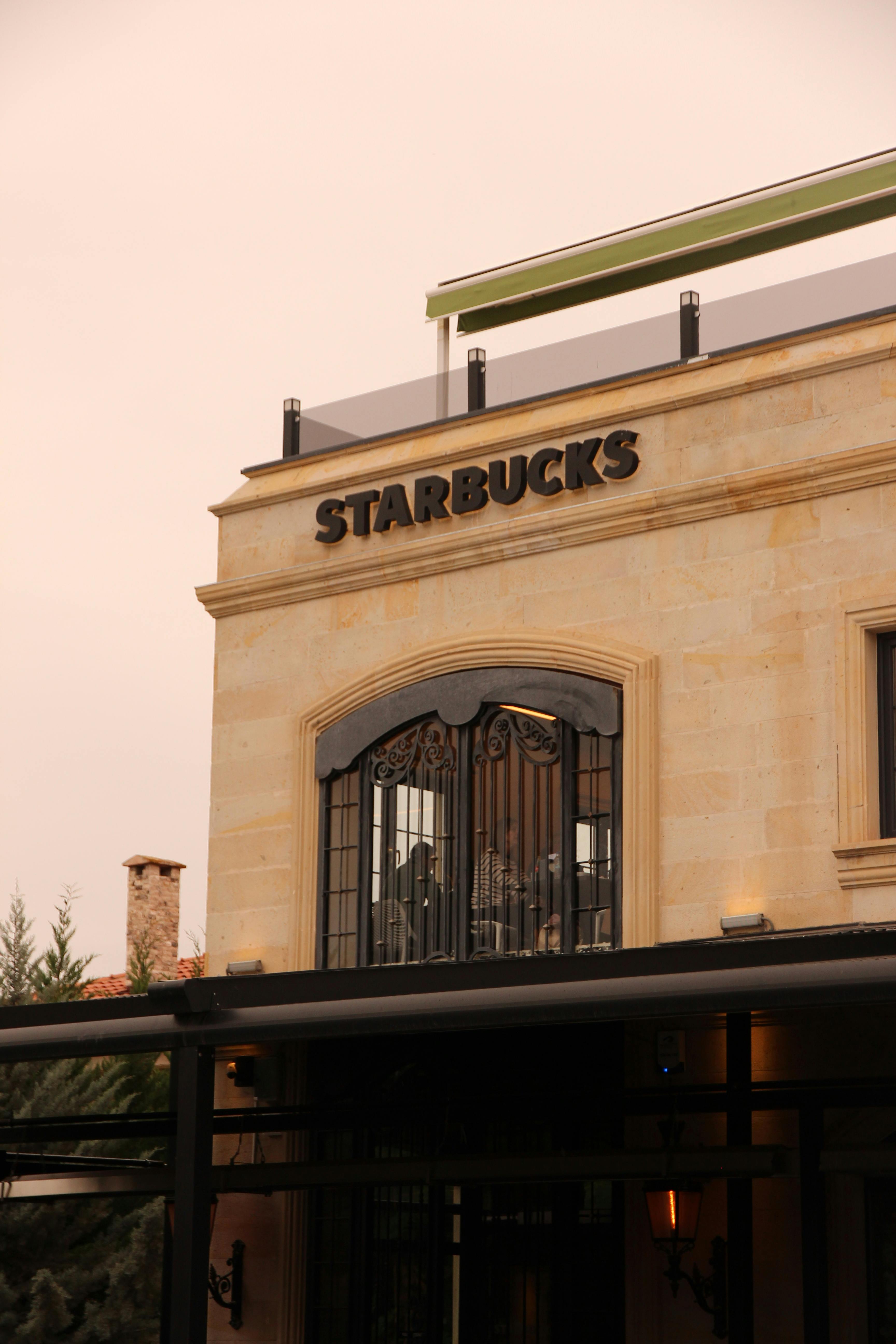 Starbucks Logo on the Wall · Free Stock Photo