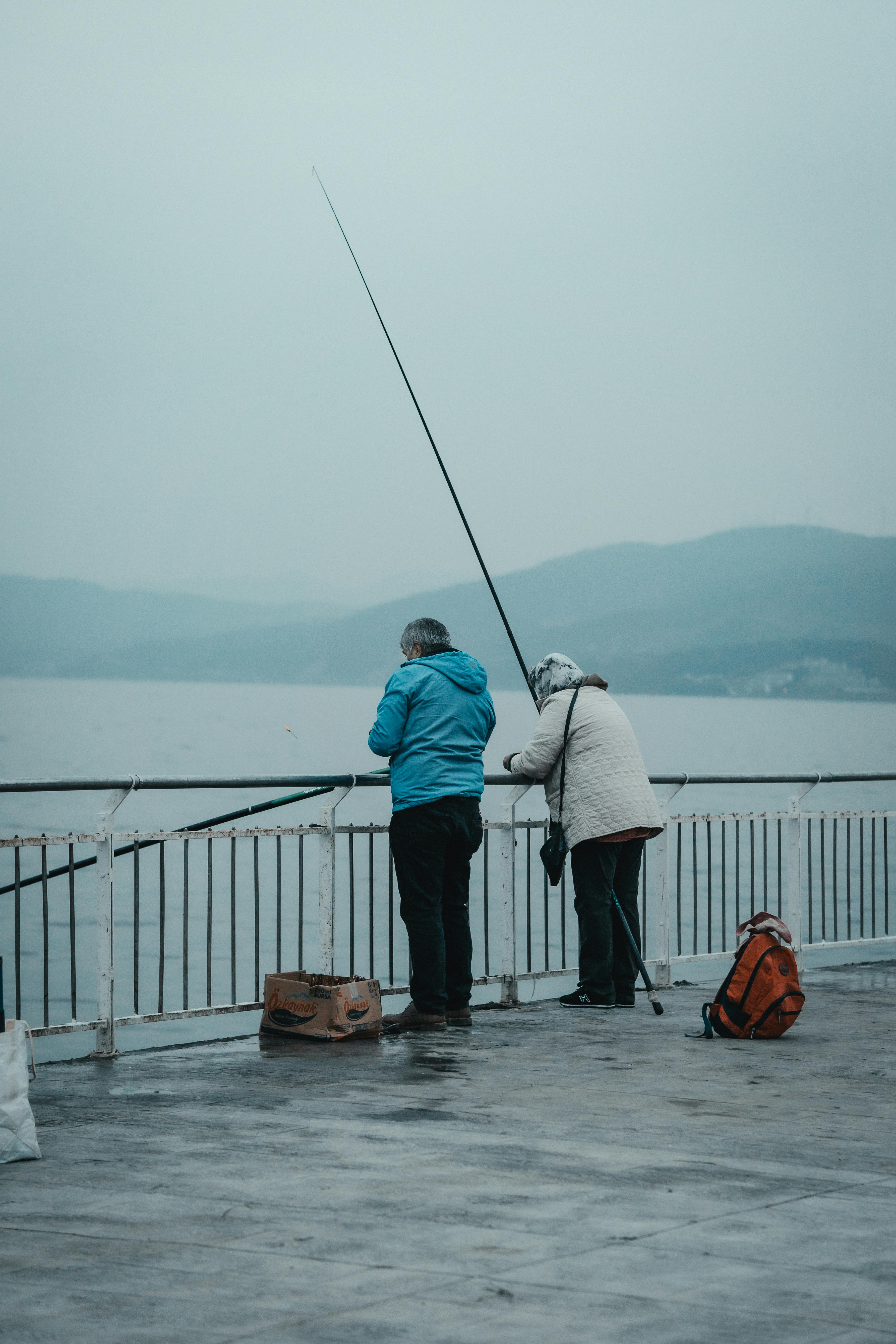 People Fishing on Beach · Free Stock Photo