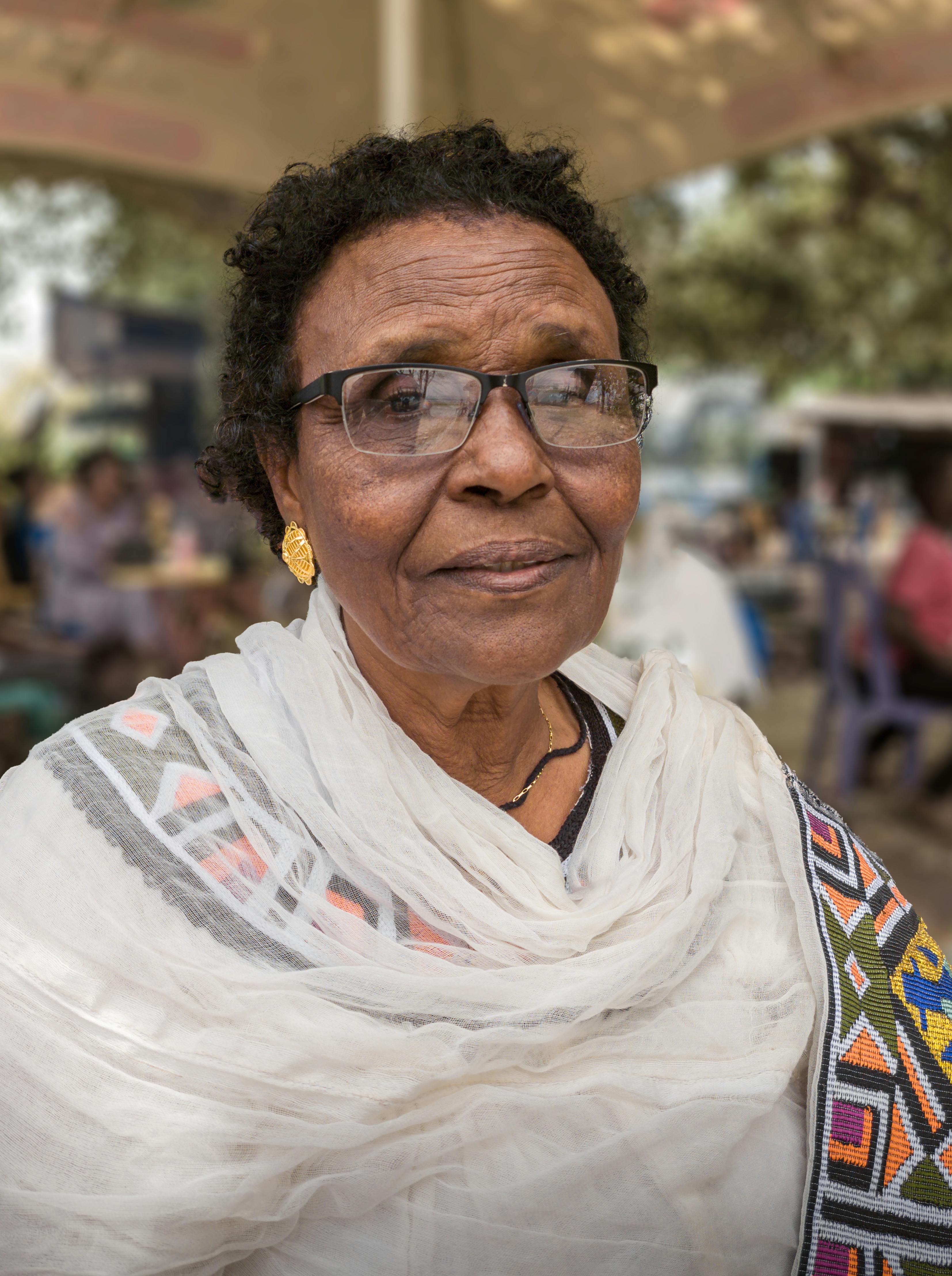 Woman Wearing Traditional Clothing and Eyeglasses · Free Stock Photo