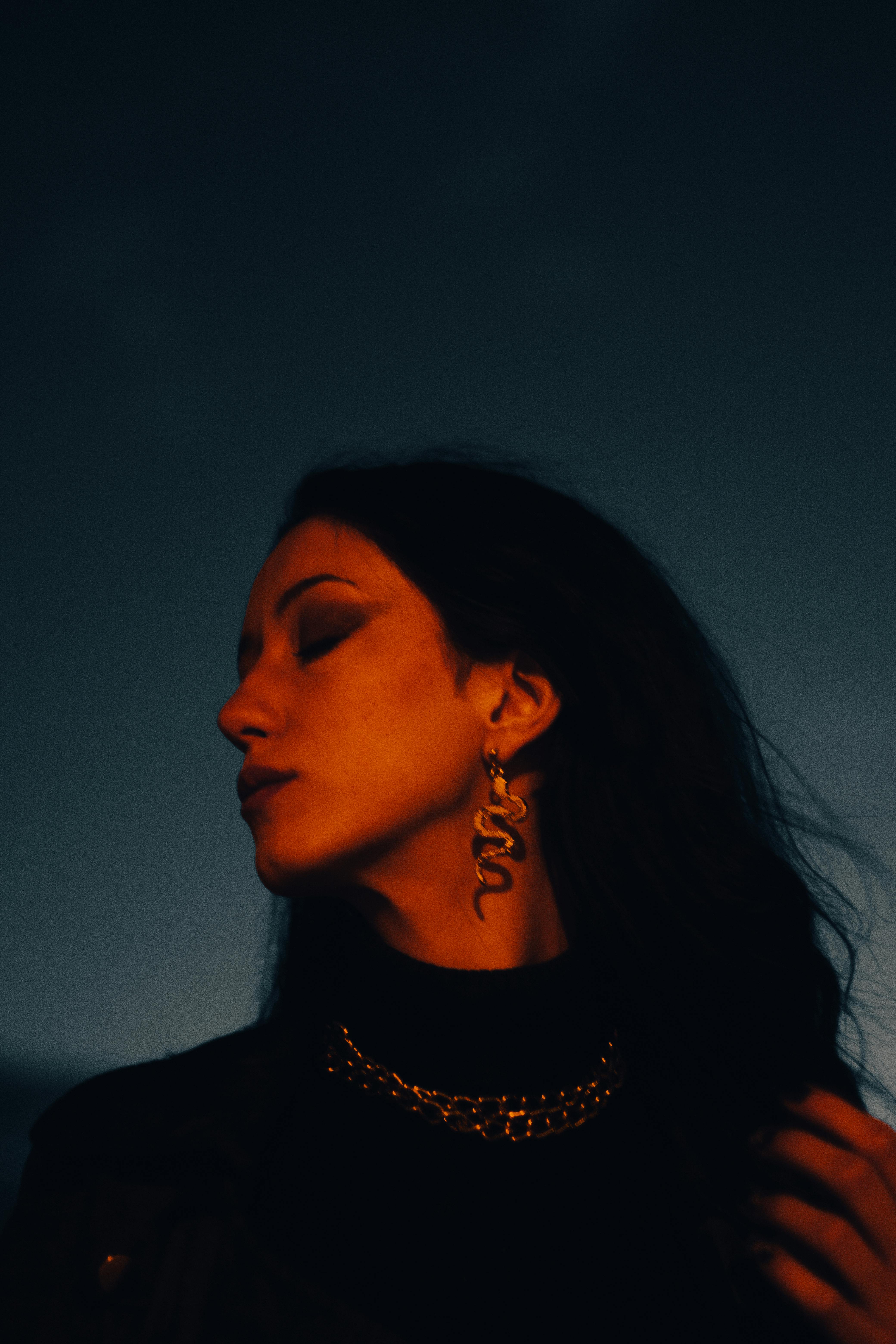 Beautiful Woman Facing Sideways · Free Stock Photo