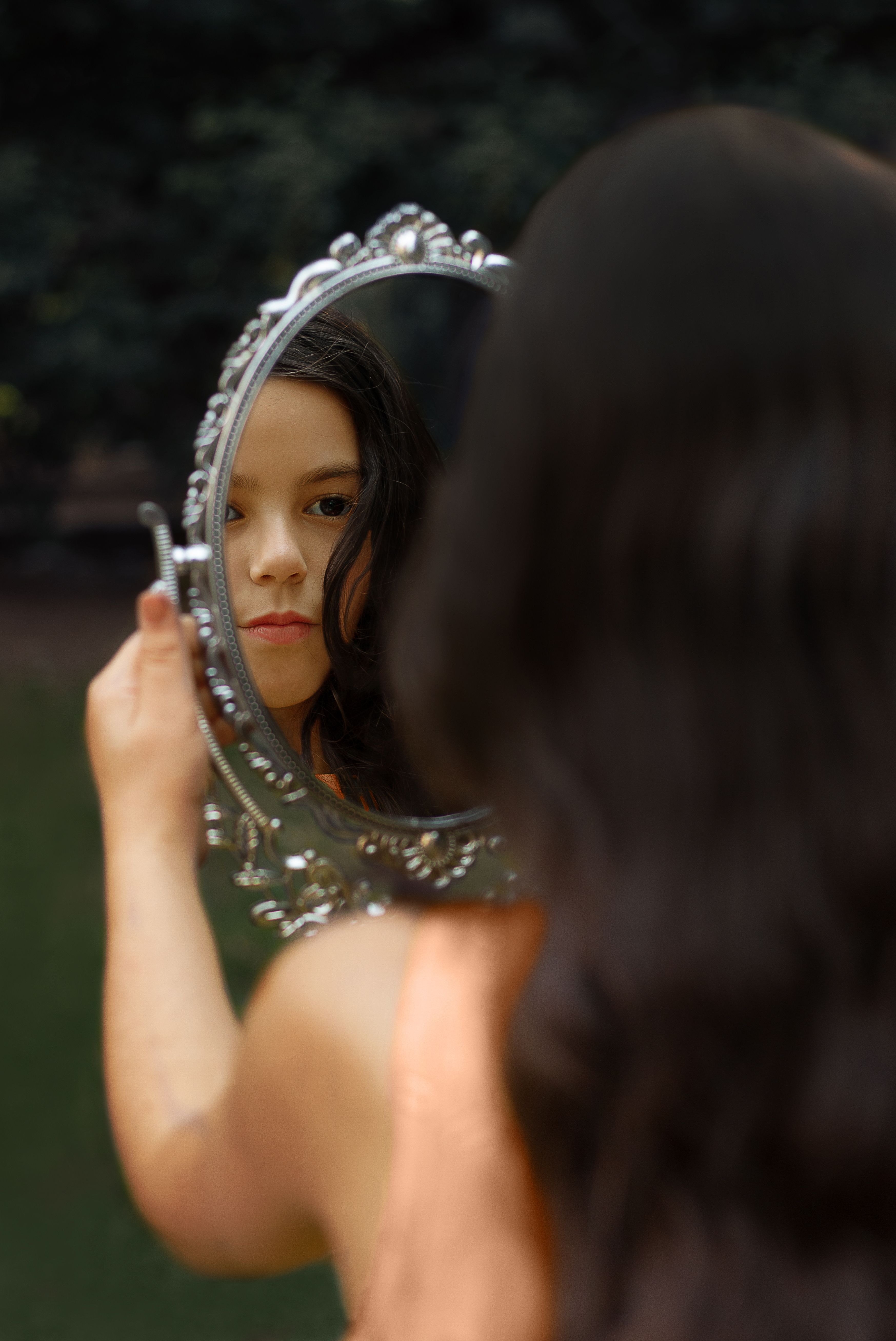 Girl Holding a Mirror · Free Stock Photo