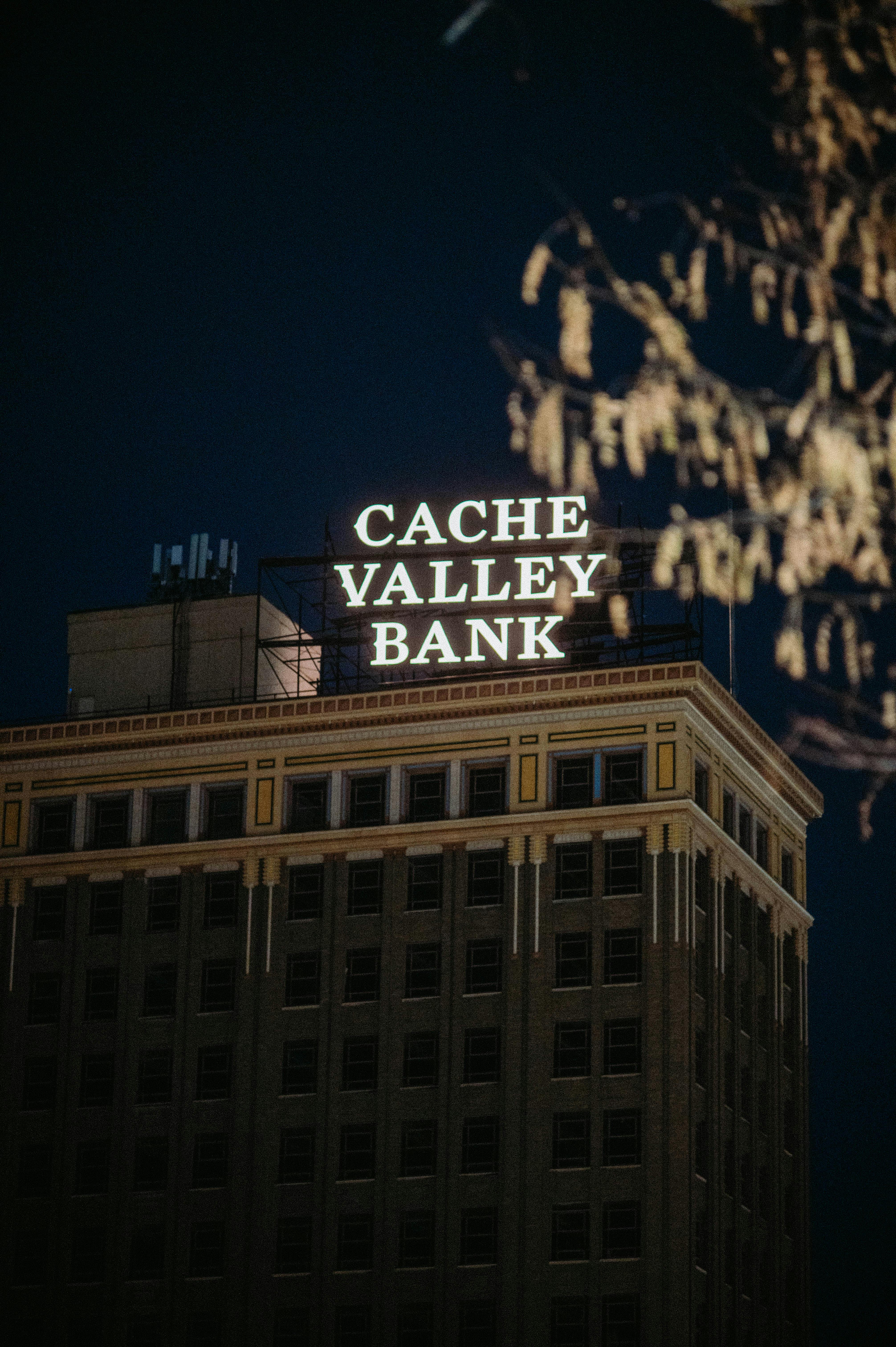 Neon Sign on Bank Building · Free Stock Photo