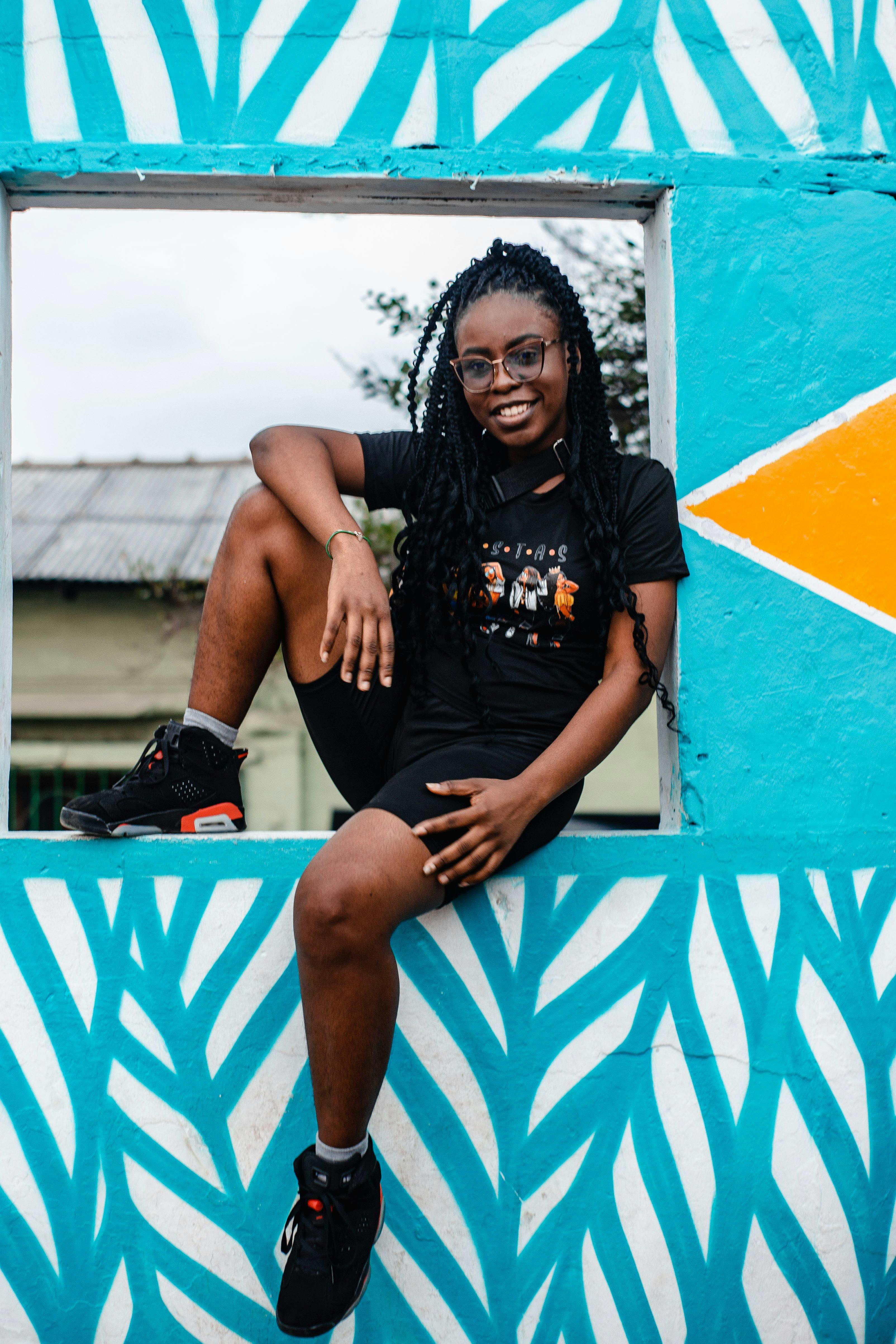 A Woman Sitting on Floor Hugging Leg · Free Stock Photo