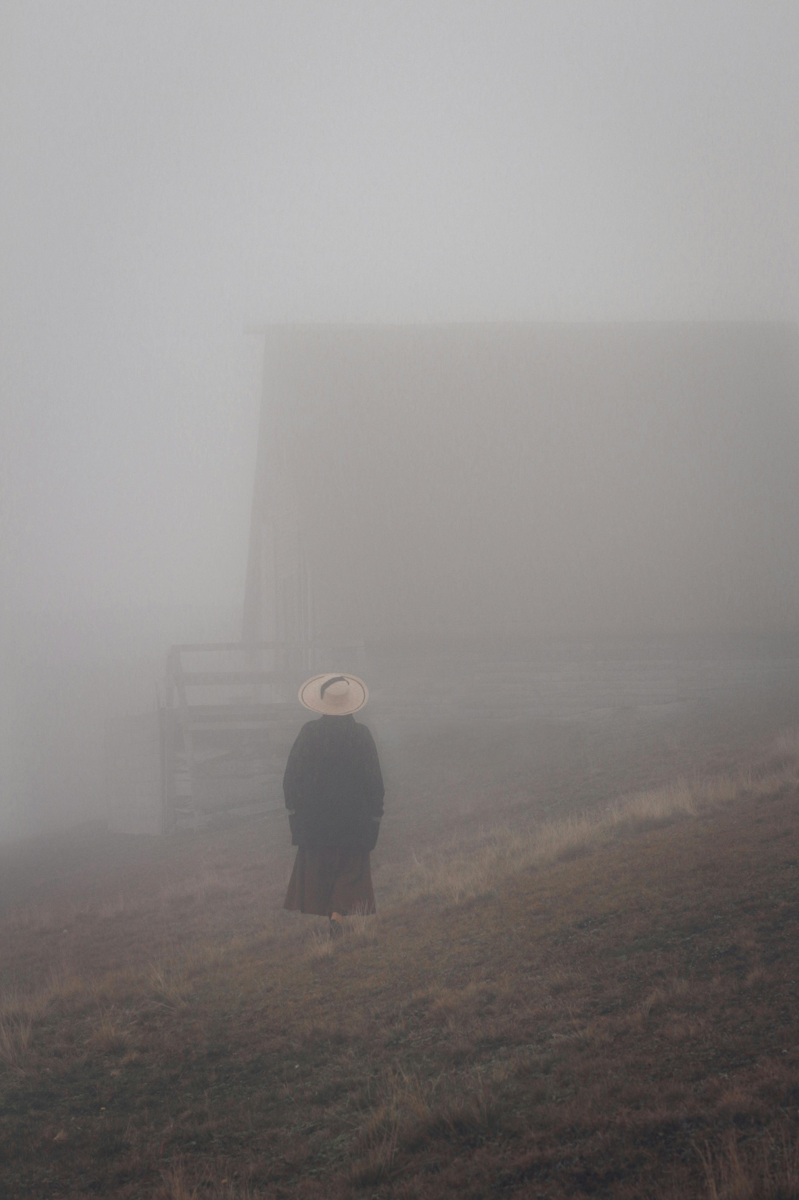 A Person Standing in a Fog · Free Stock Photo