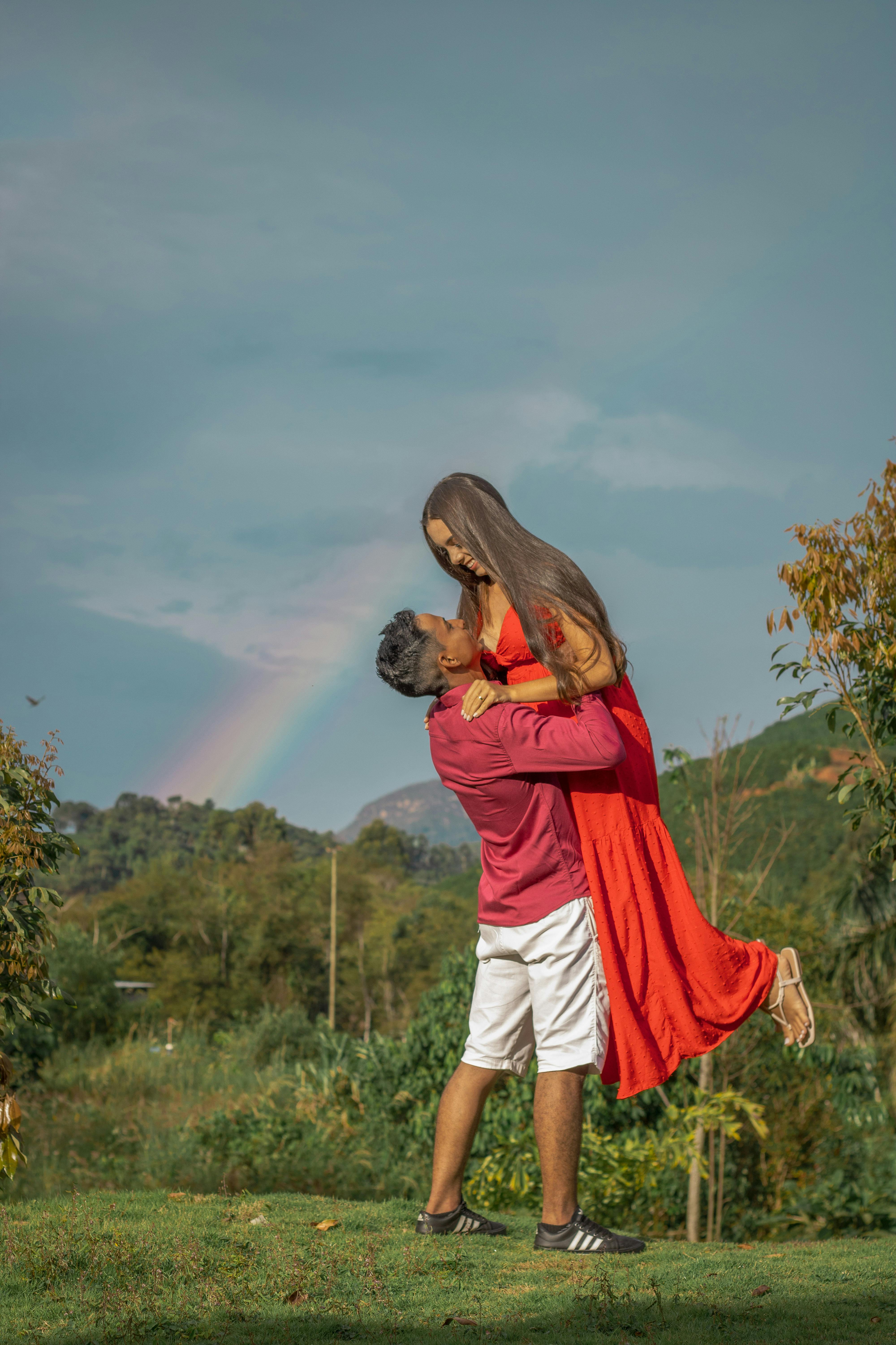 A Man Carrying His Partner · Free Stock Photo