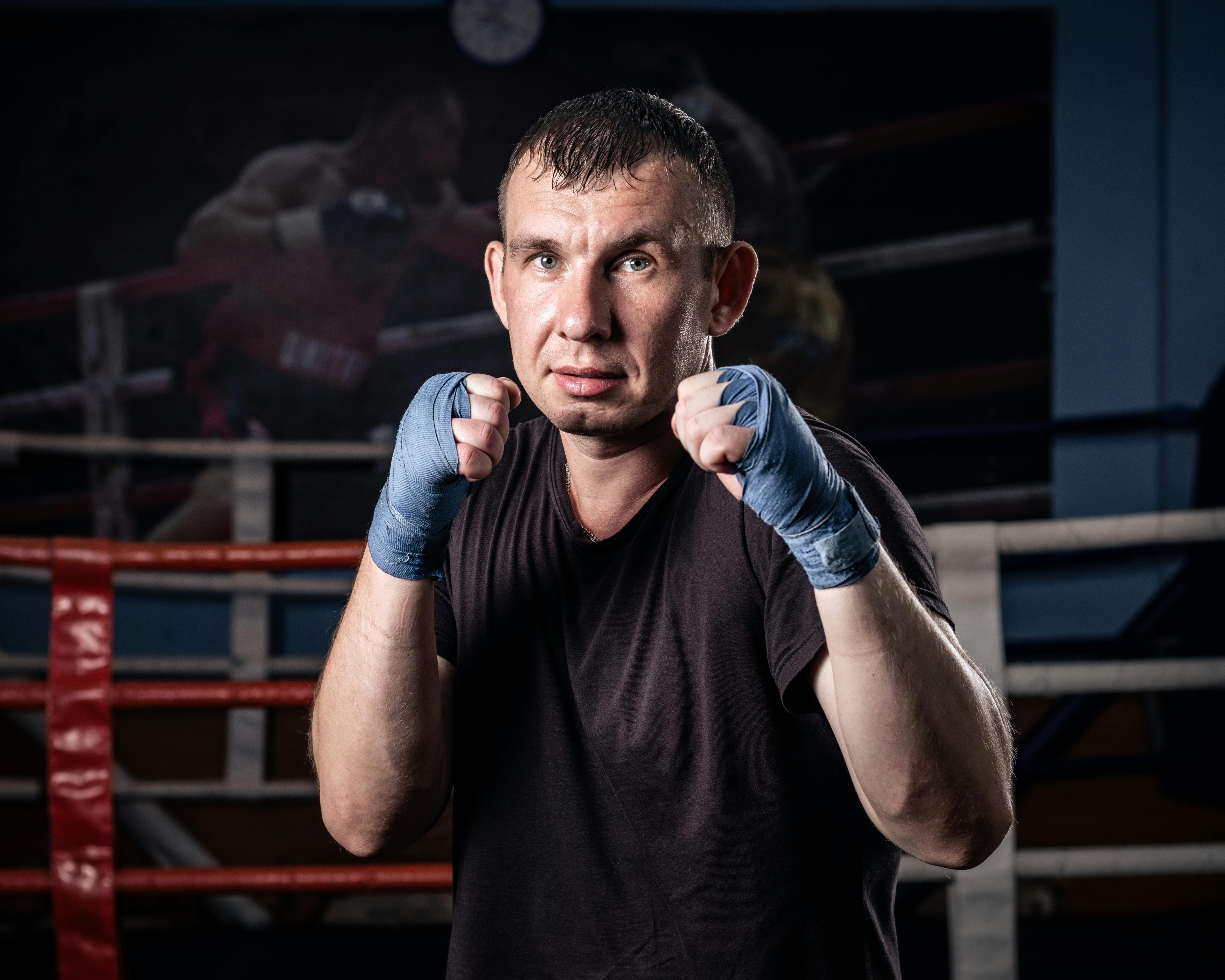 Shirtless Muscular Man in Sunglasses Posing at Boxing Ring · Free Stock ...
