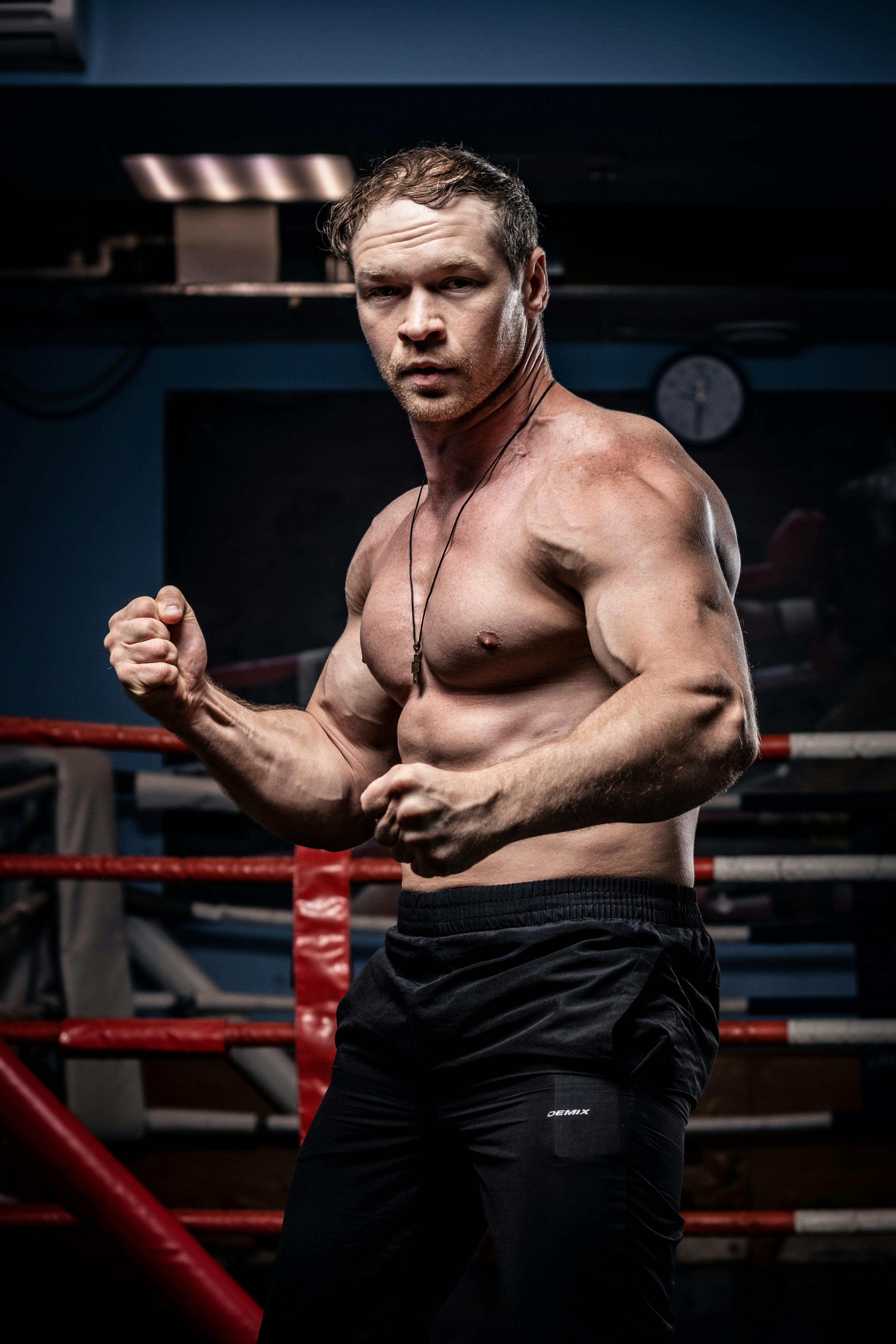 A Shirtless Bodybuilder at the Gym · Free Stock Photo