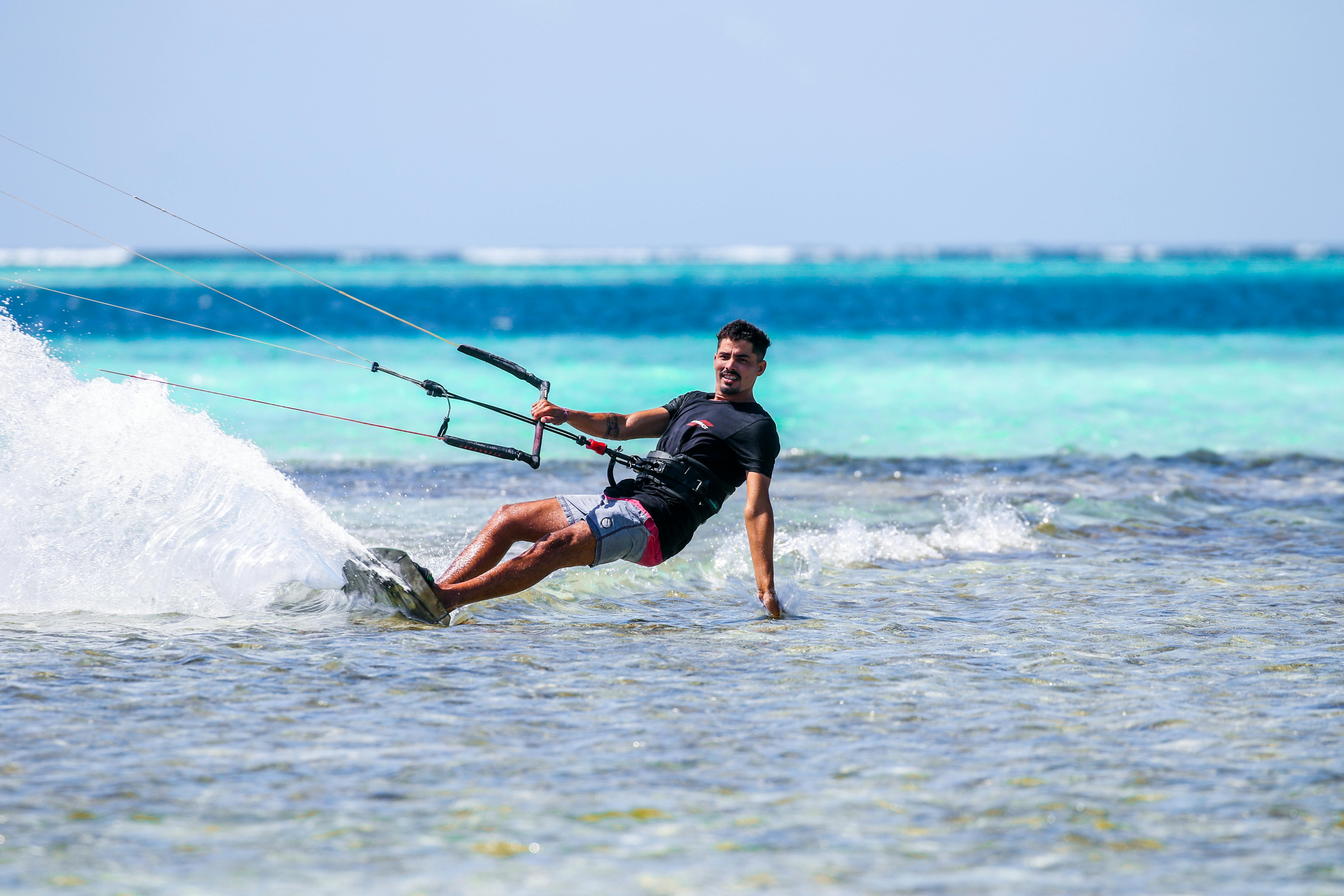 Man Kitesurfing in a Horizontal Position · Free Stock Photo