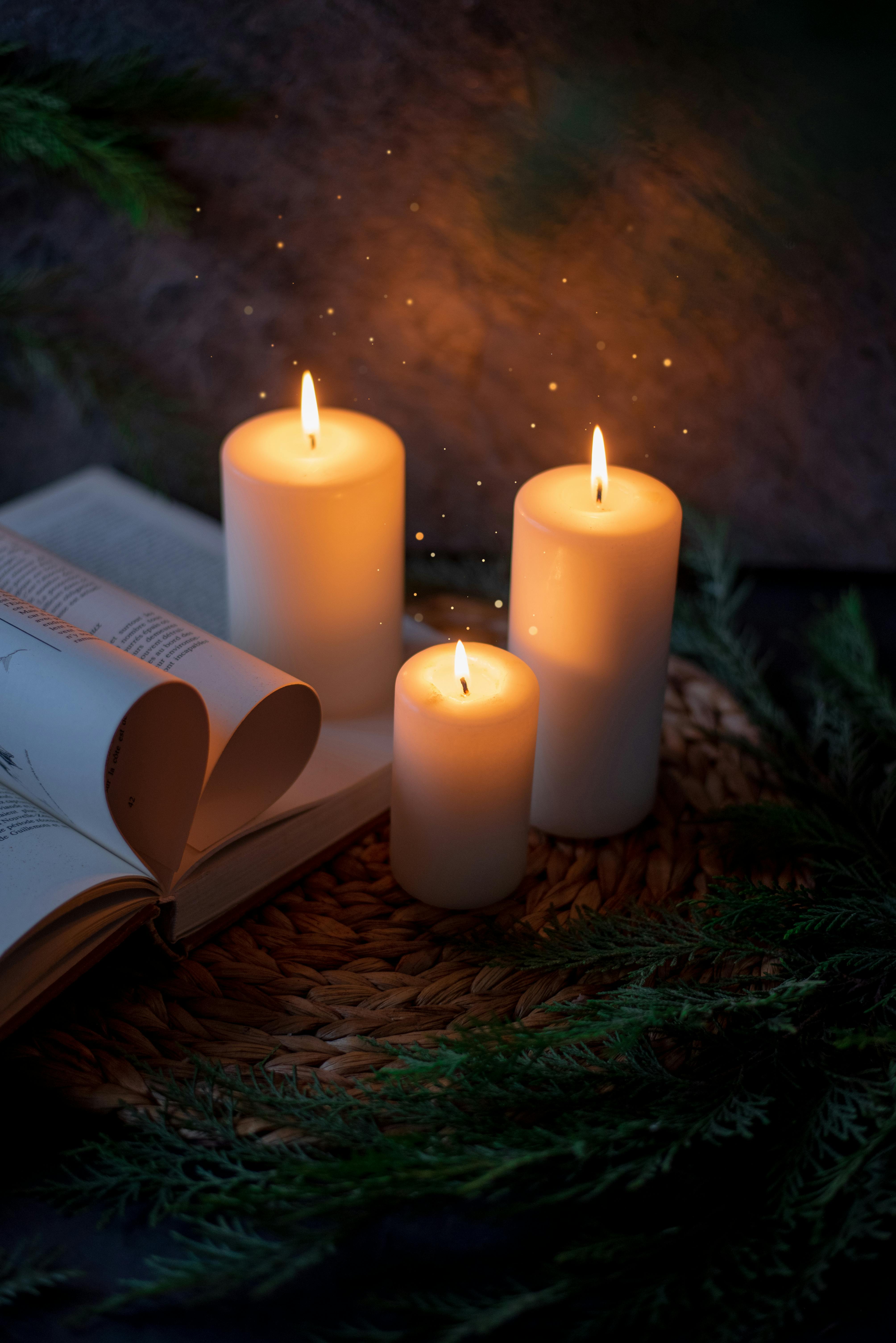 A Book and Candles · Free Stock Photo