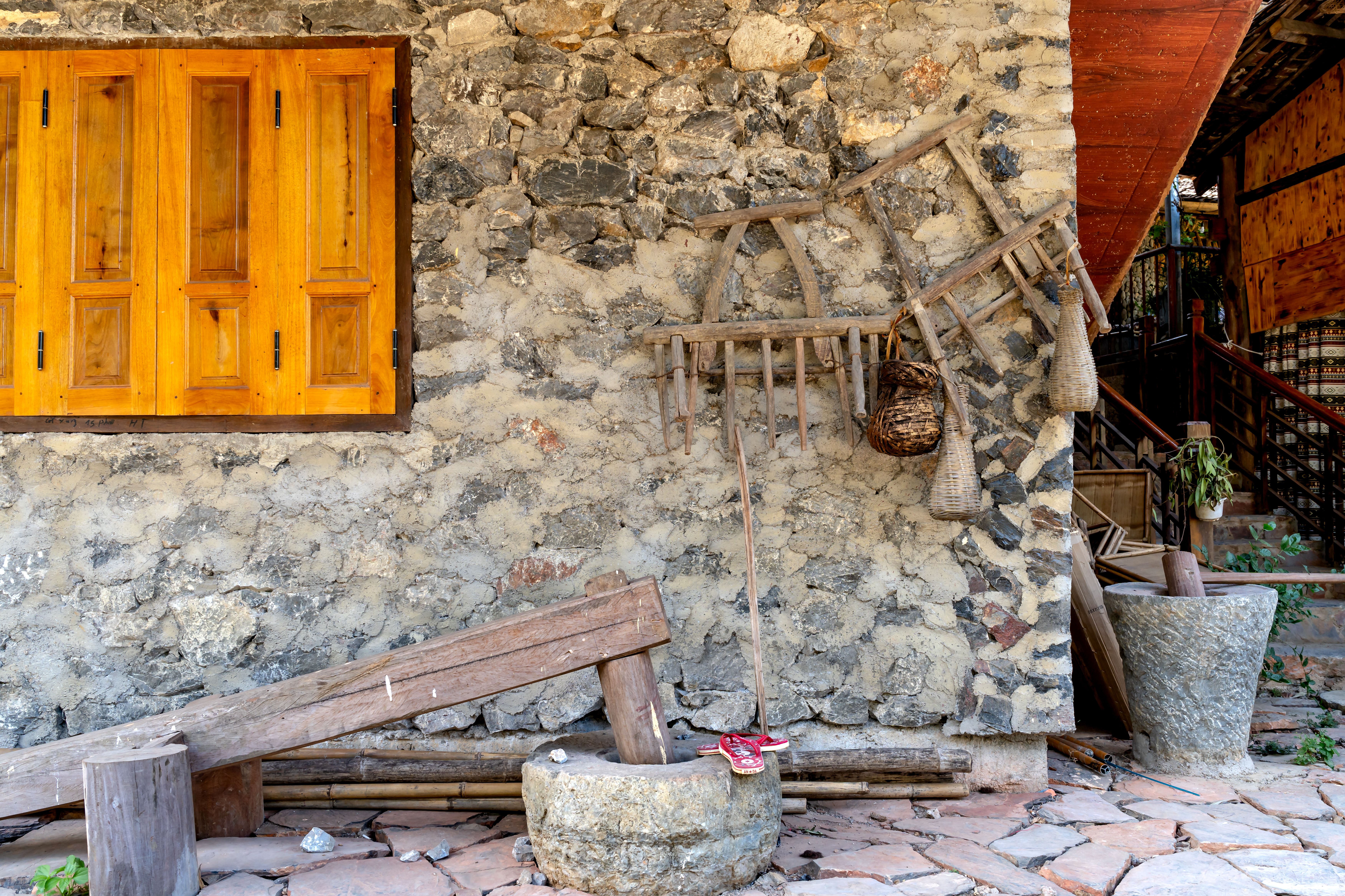 Antique Wooden Items Outside of a House · Free Stock Photo