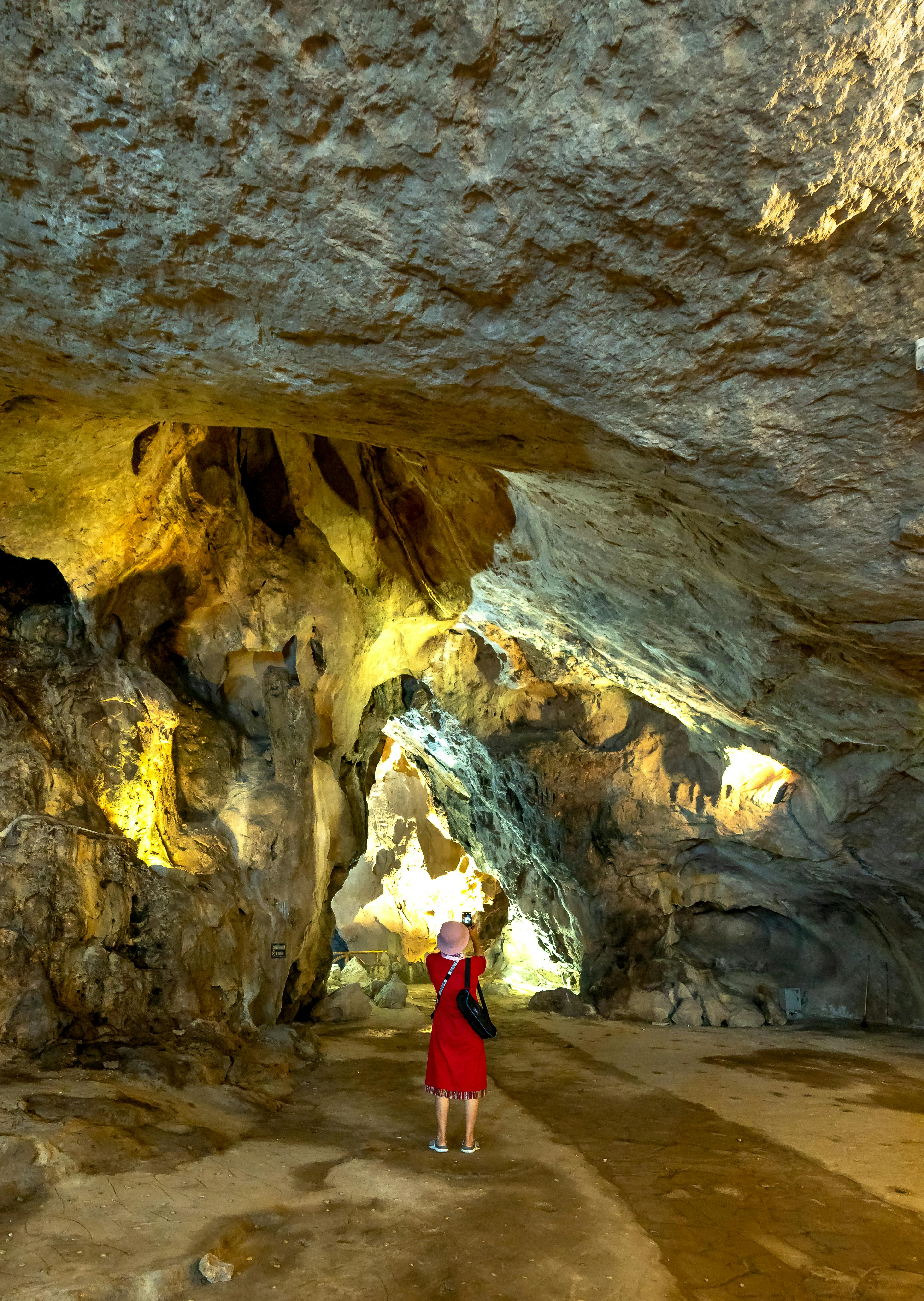 Woman in Red Dress in the Cave · Free Stock Photo