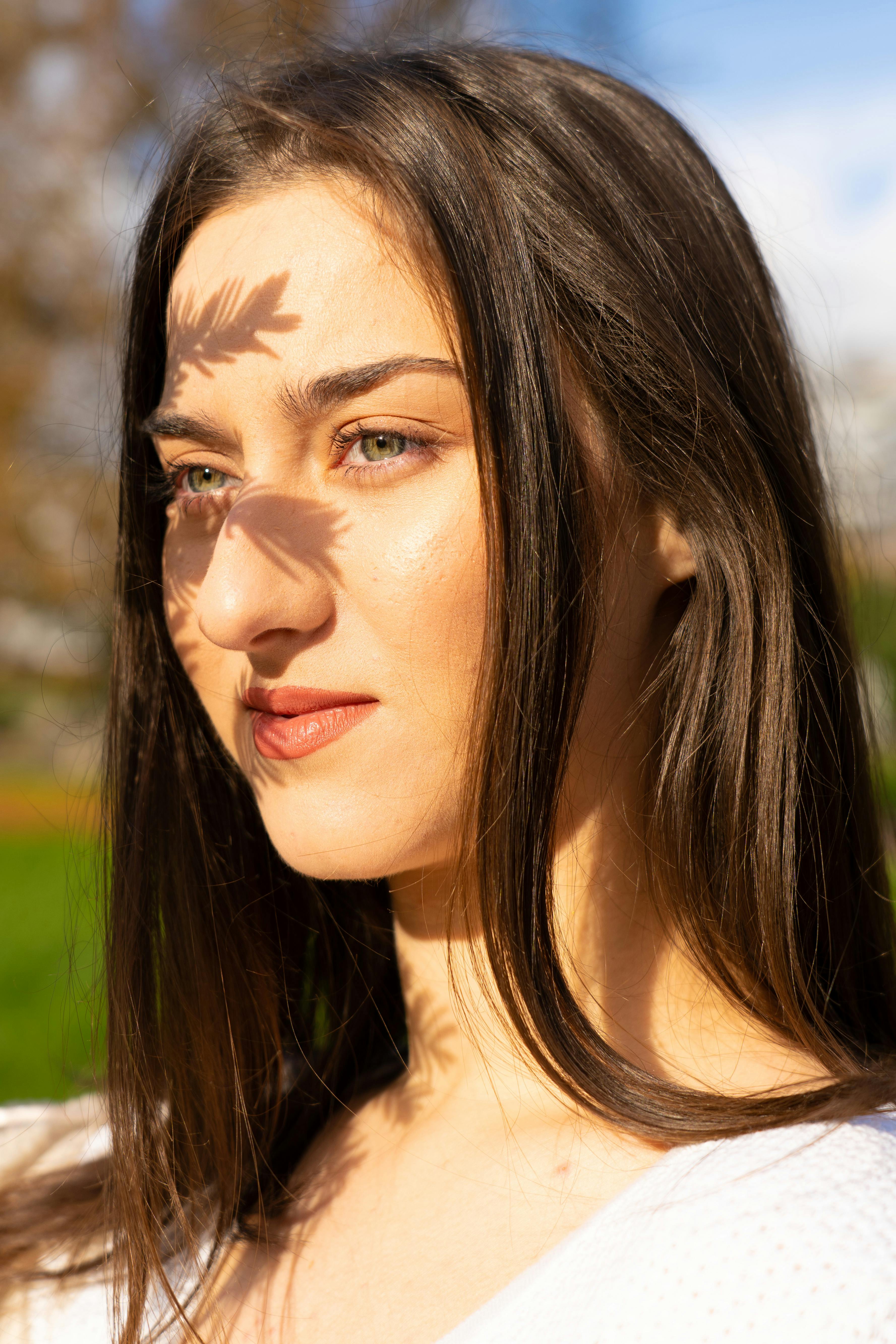 Sunlit Face of Woman · Free Stock Photo