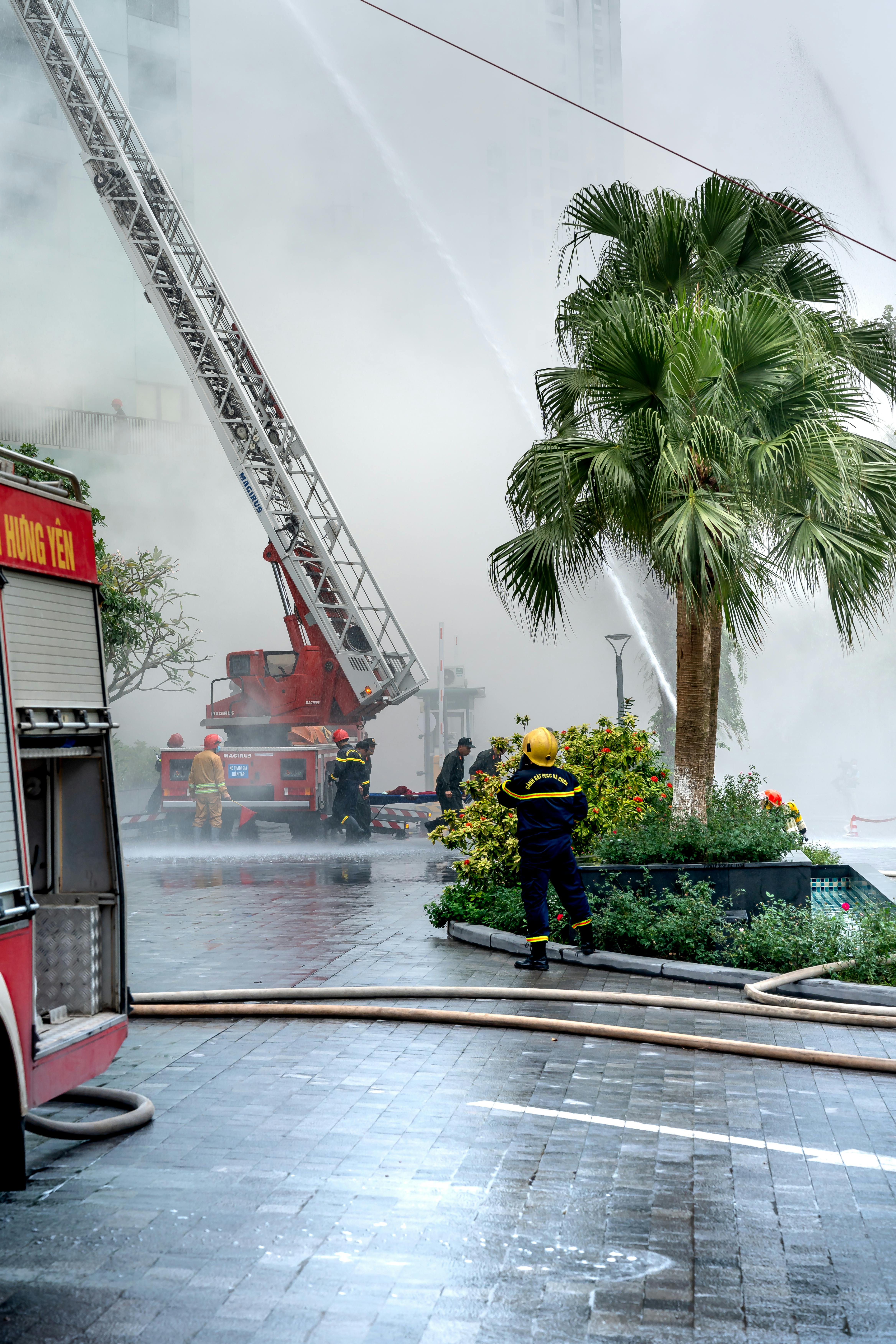 Fire Engine with Ladder during Fire · Free Stock Photo