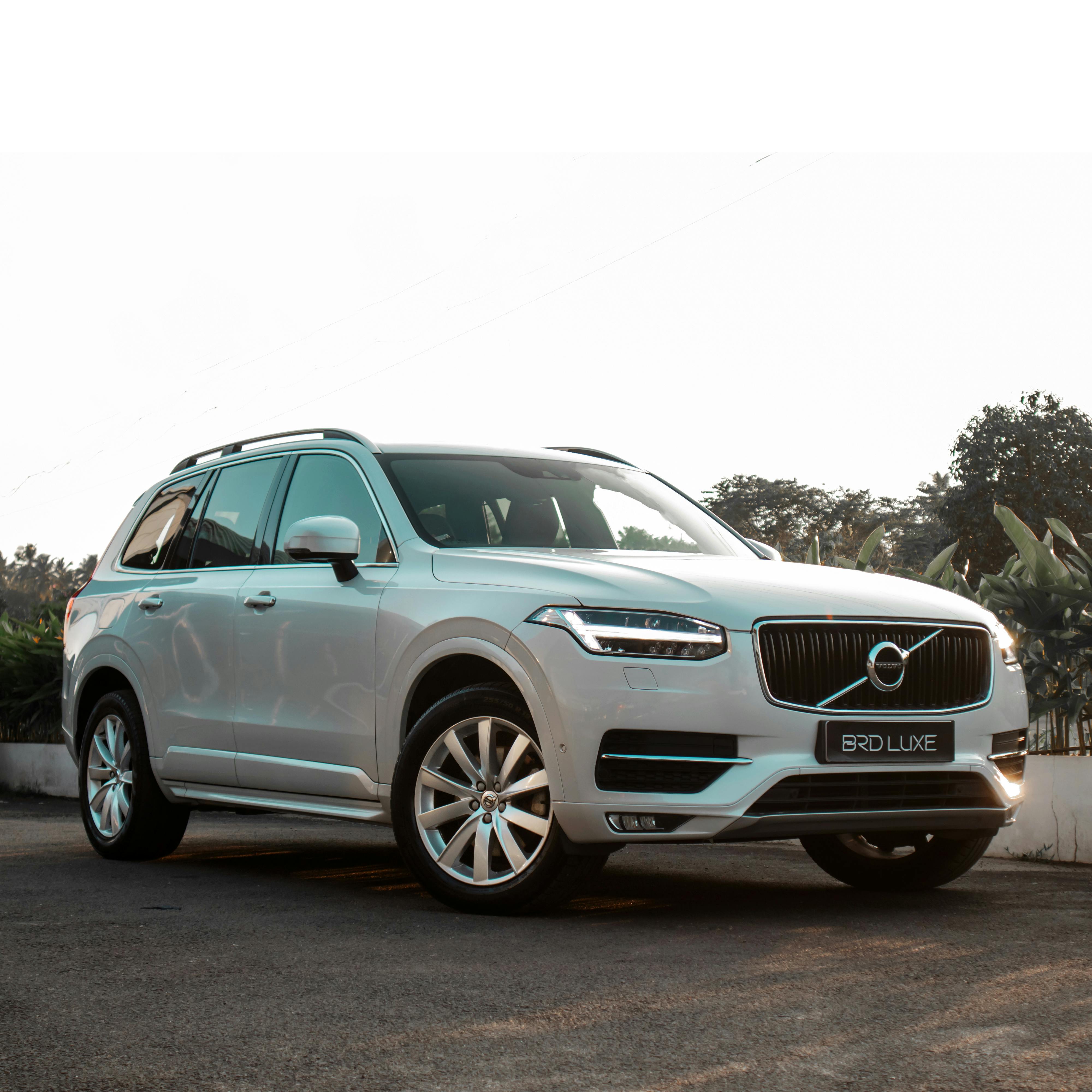 Luxury White Vehicle on the Road · Free Stock Photo