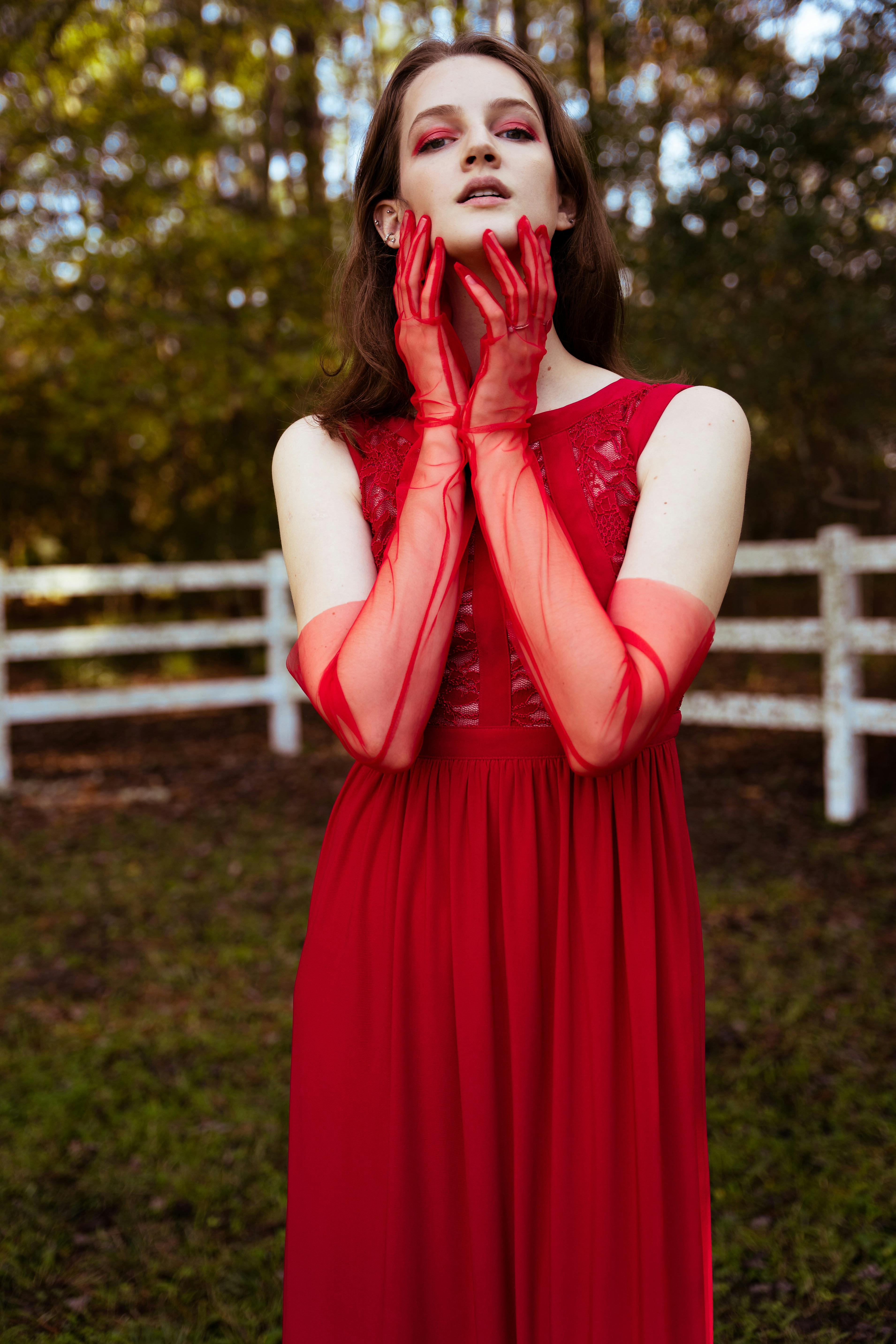 Model posing in Red Dress and Gloves · Free Stock Photo